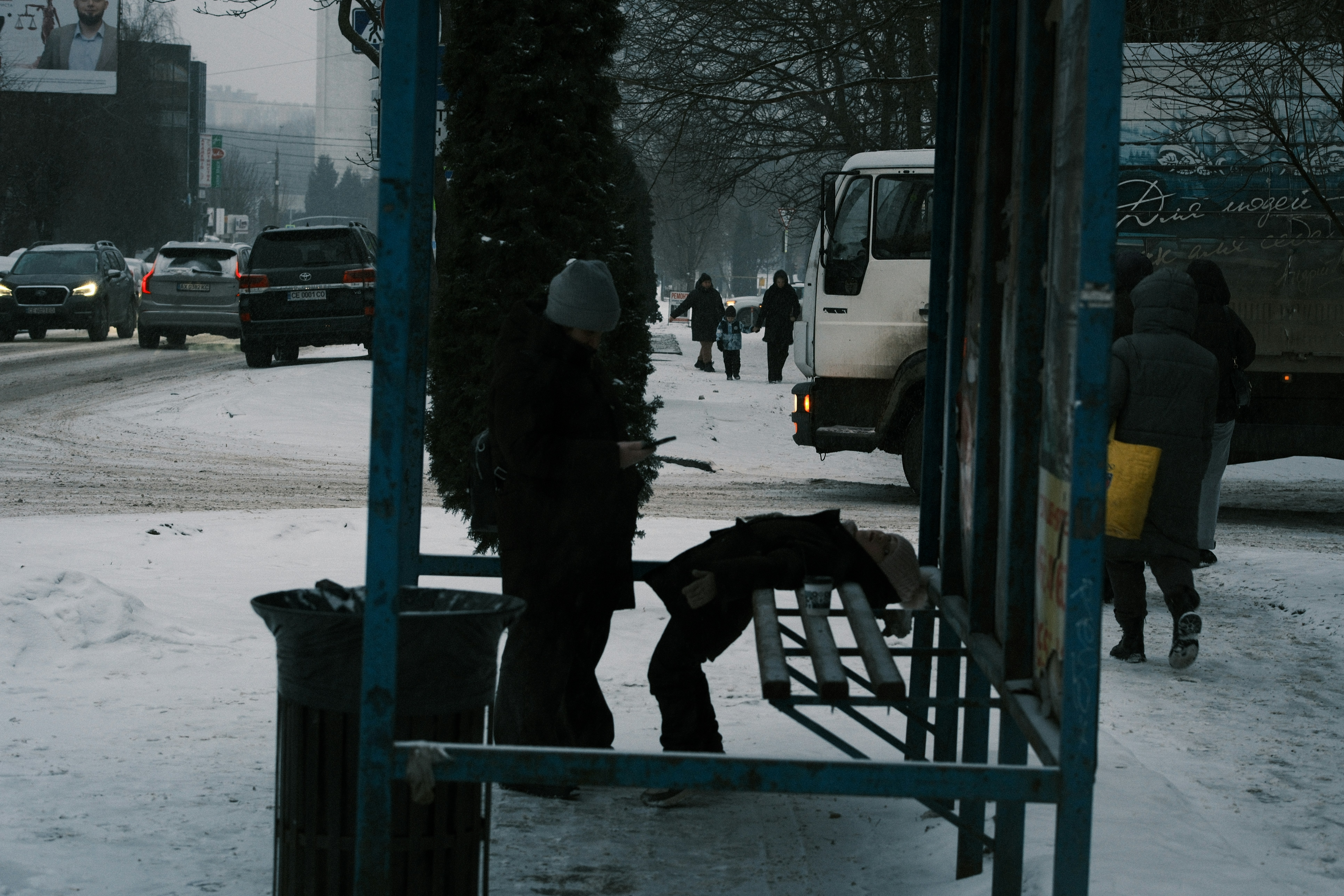 Snowy Bus Stop in Silence: Footsteps and a Bus Cut Through the Quiet