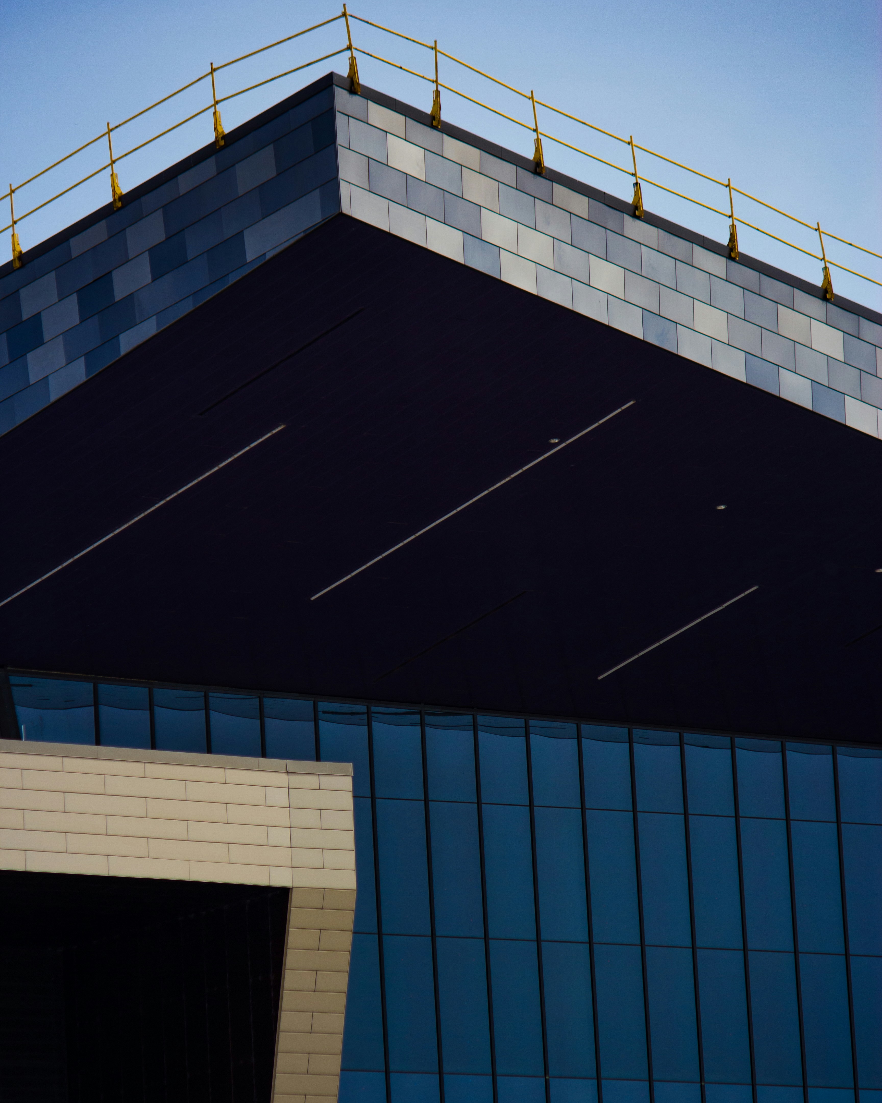 Intersection of Sky and Architecture: A Modern Rooftop Edge