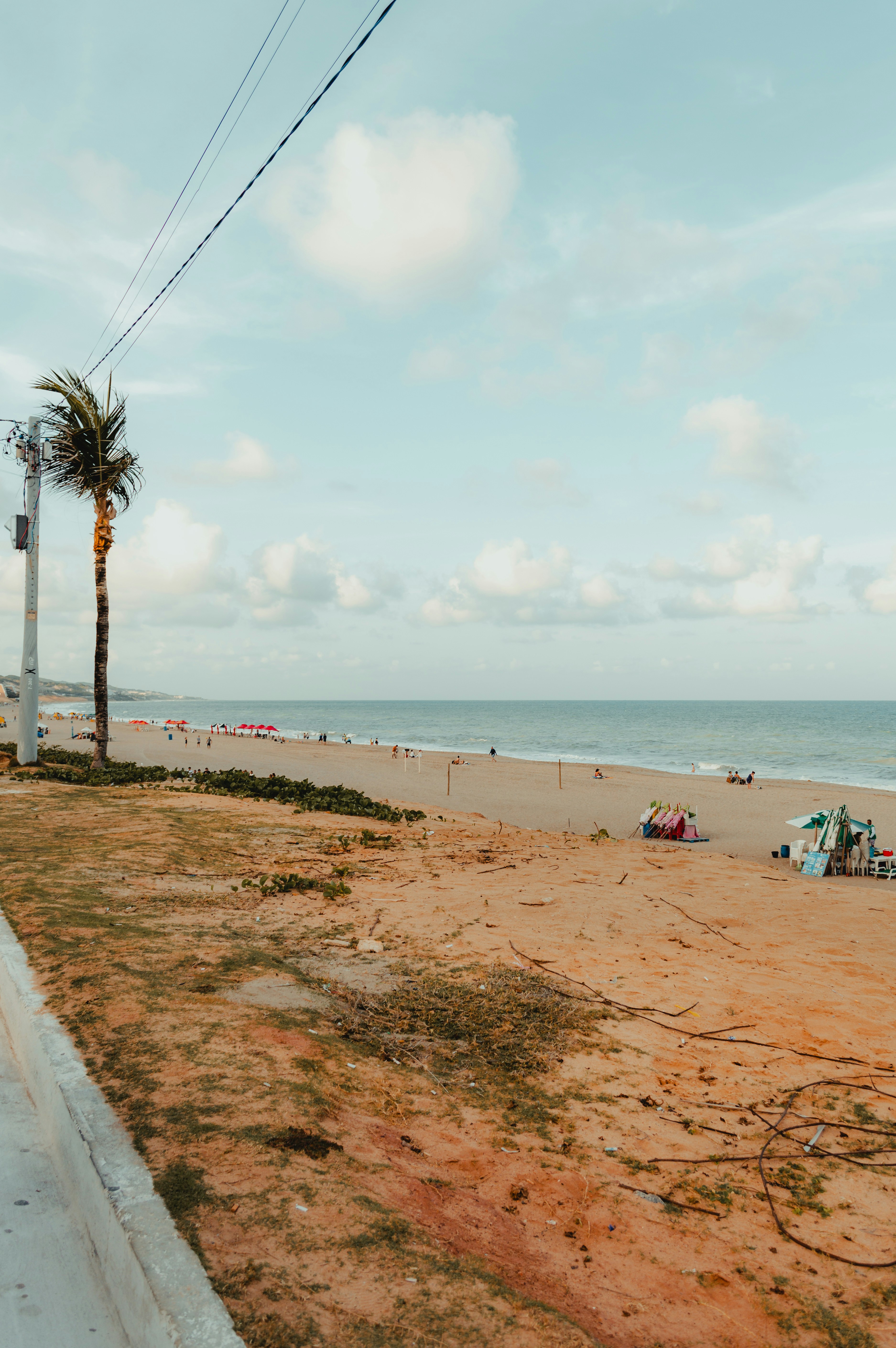 Coastal Boulevard: A Quiet Beach Day Under Wide Sky