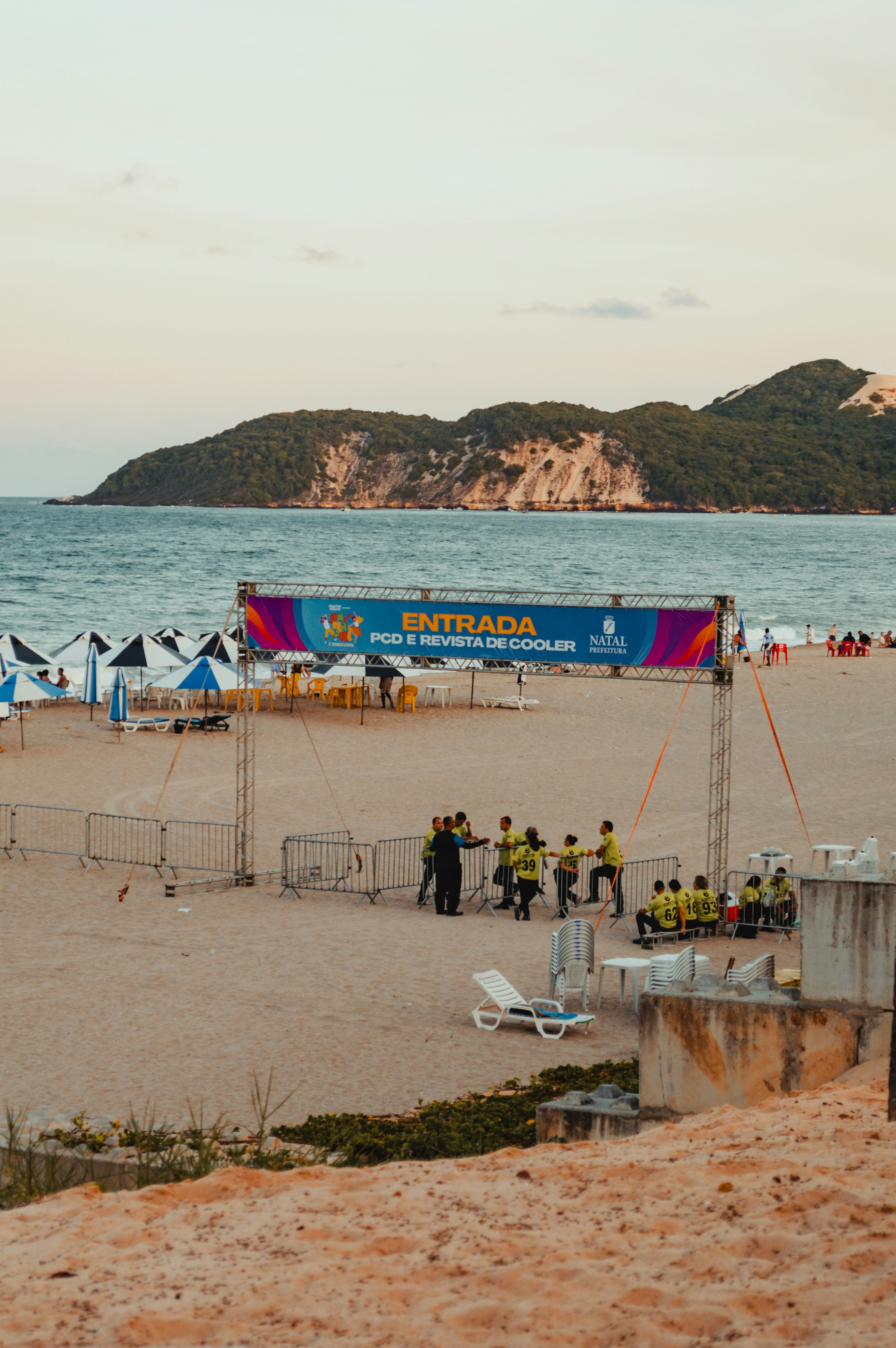Finish Line Banner Across a Quiet Beach at Sunset