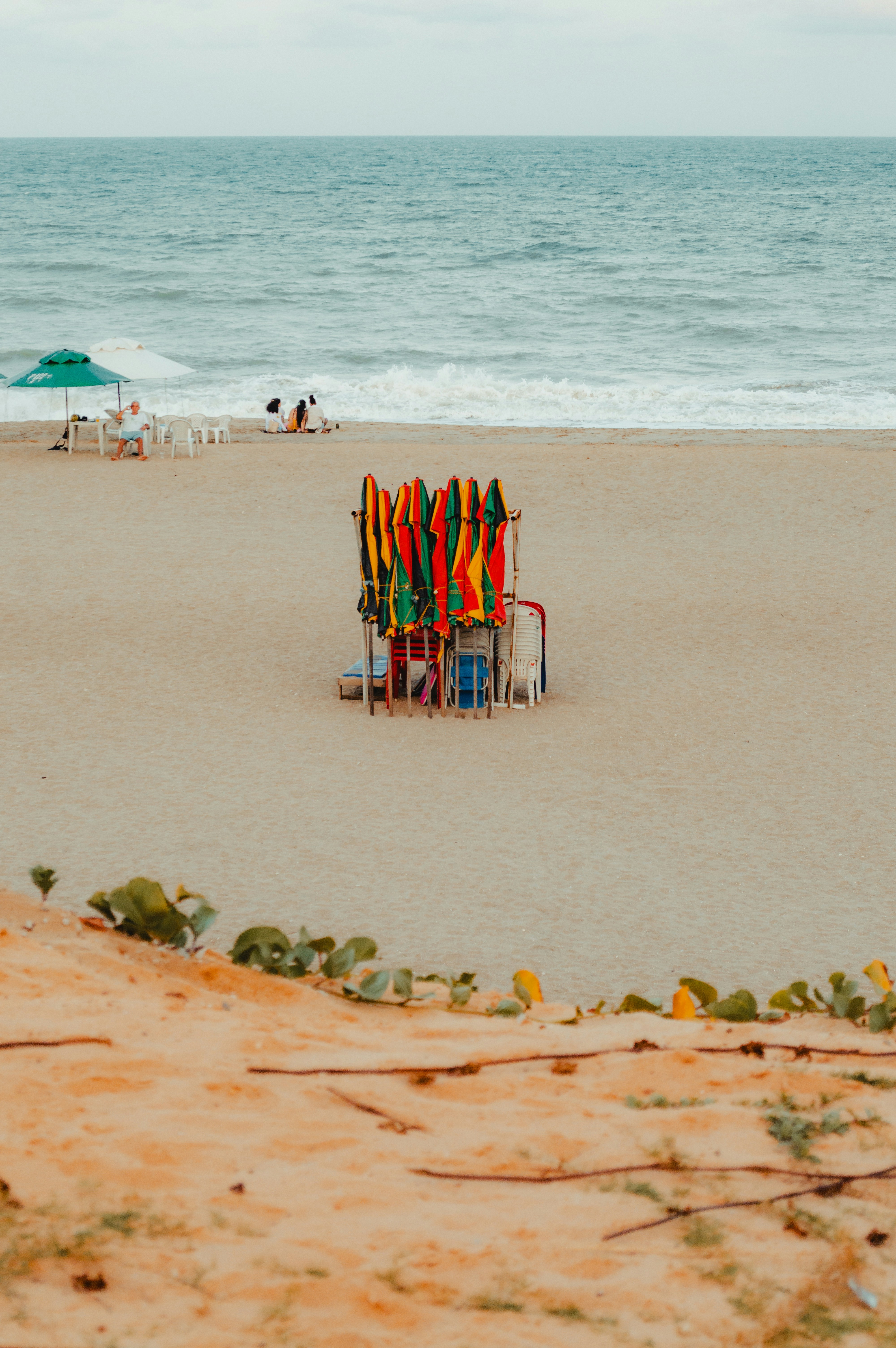 Stacked Beach Chairs: Colorful Rows Facing the Ocean