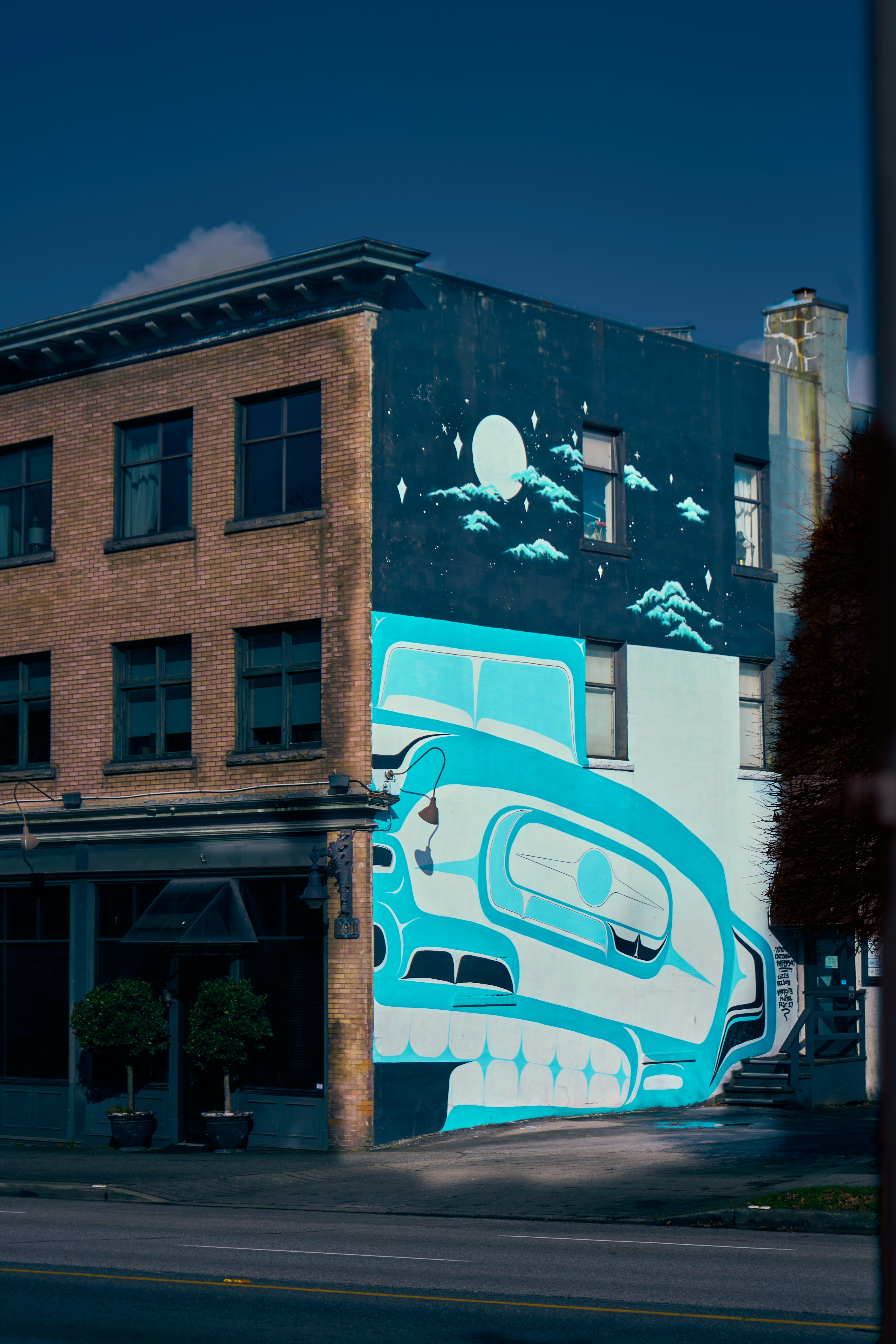 Blue Moonlit Street Car Mural on a Corner Building