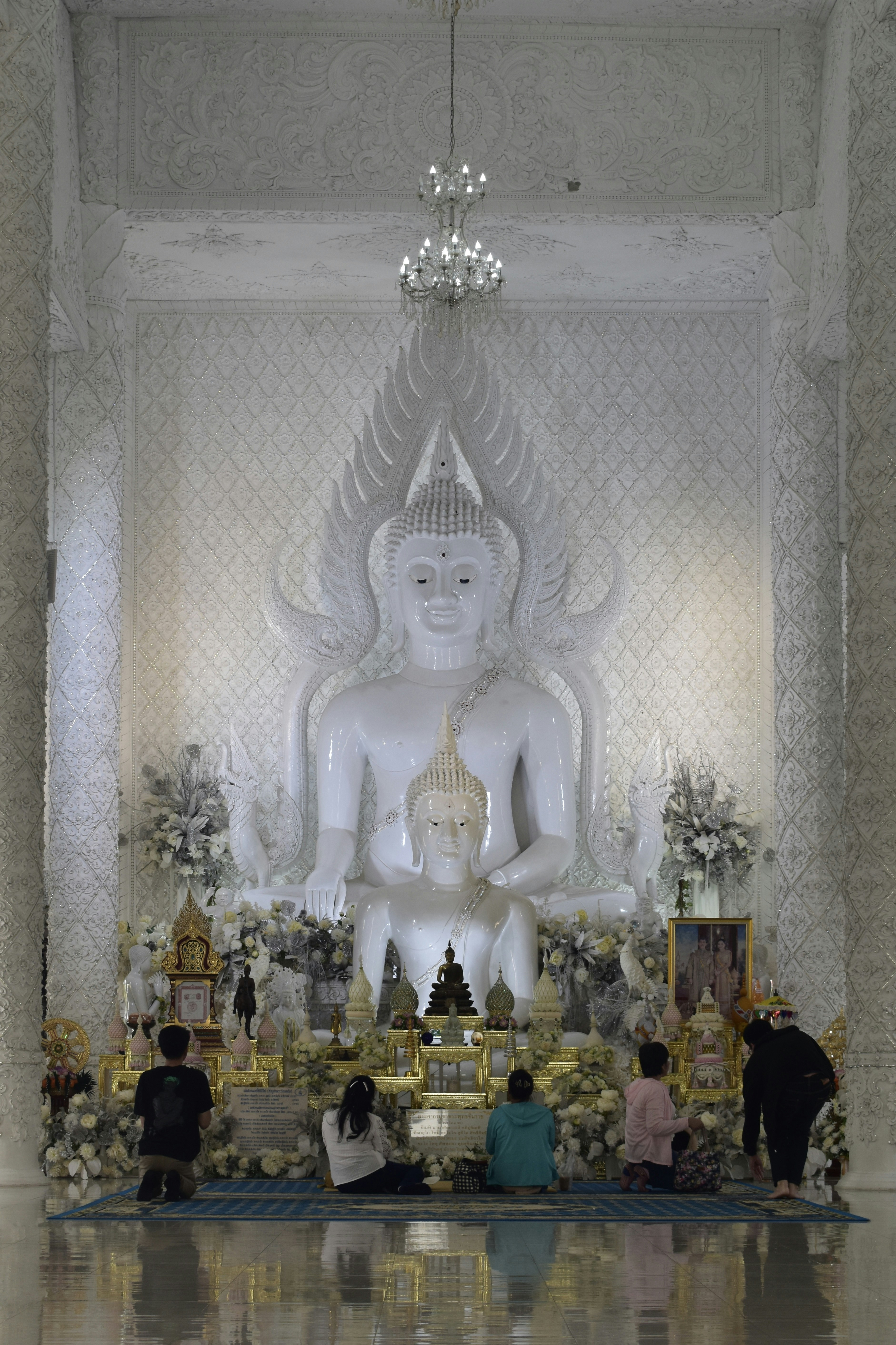 Sacred Silence: Devotees in a White Temple Awe