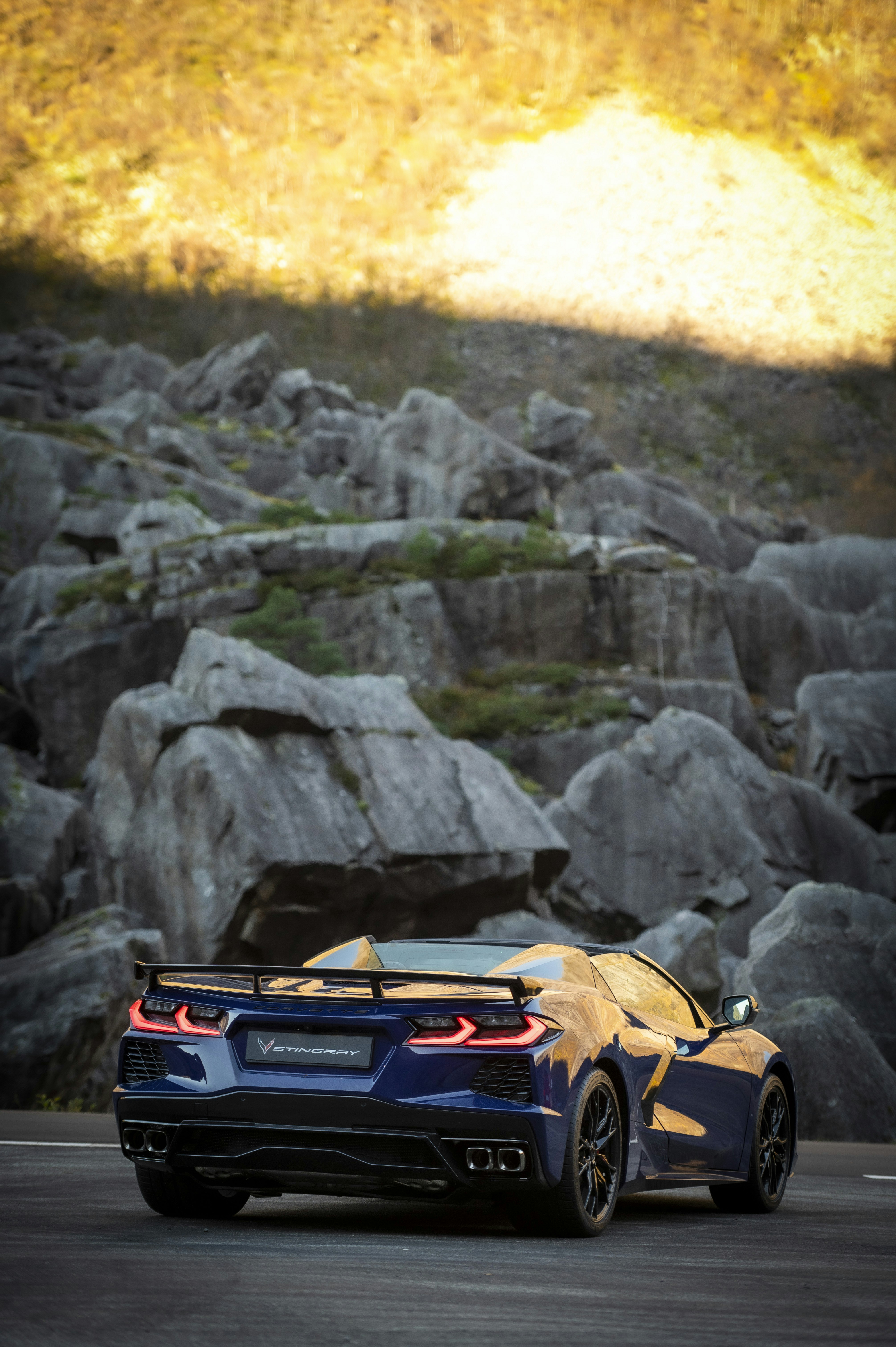 Blue Thunder on the Rocks: A Hypercar at Dusk