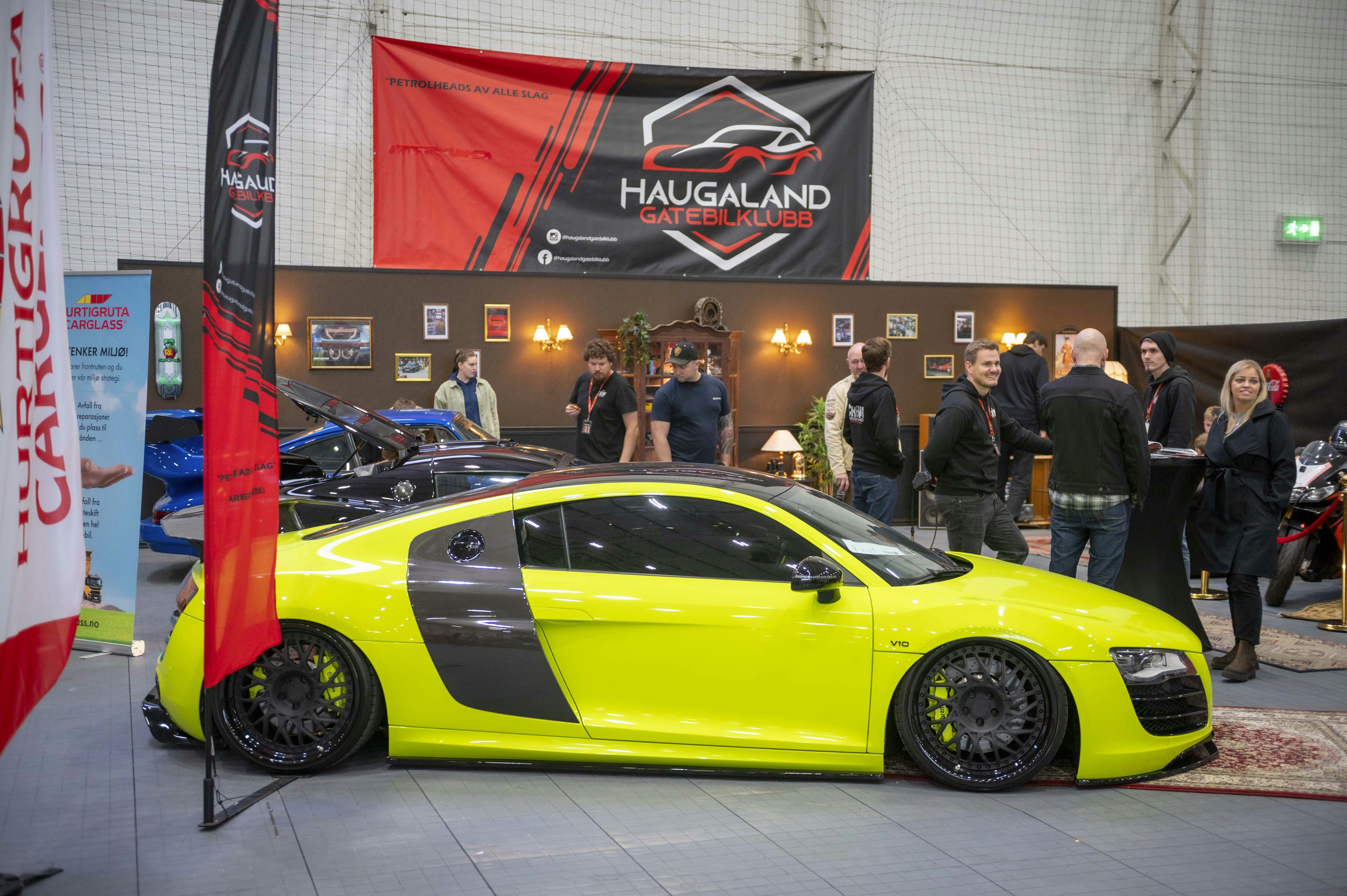Vibrant Exotic: A Lime Corvette Stacks Attention at the Car Show