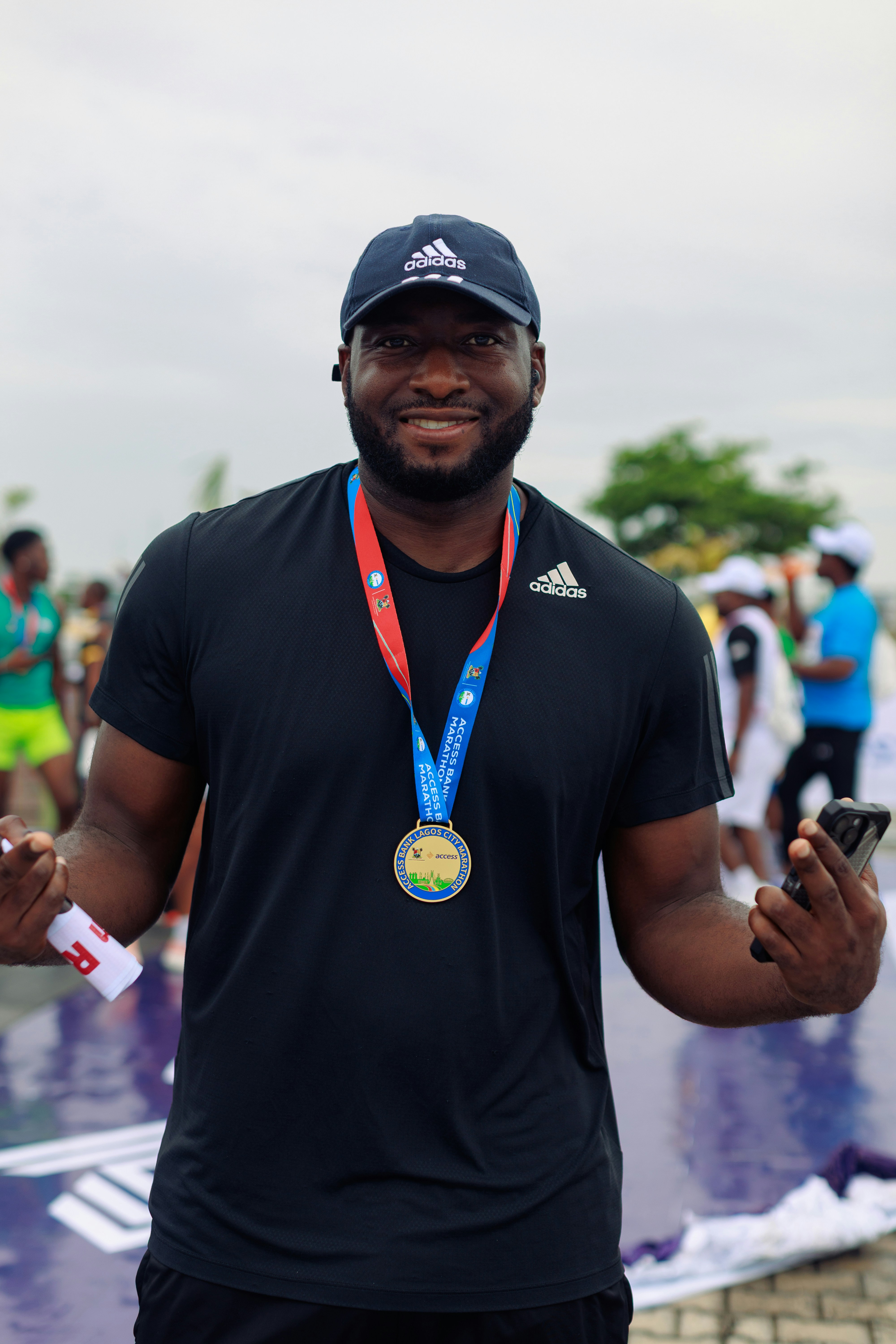 Medallic Moment: A Celebratory Athlete at Center Stage