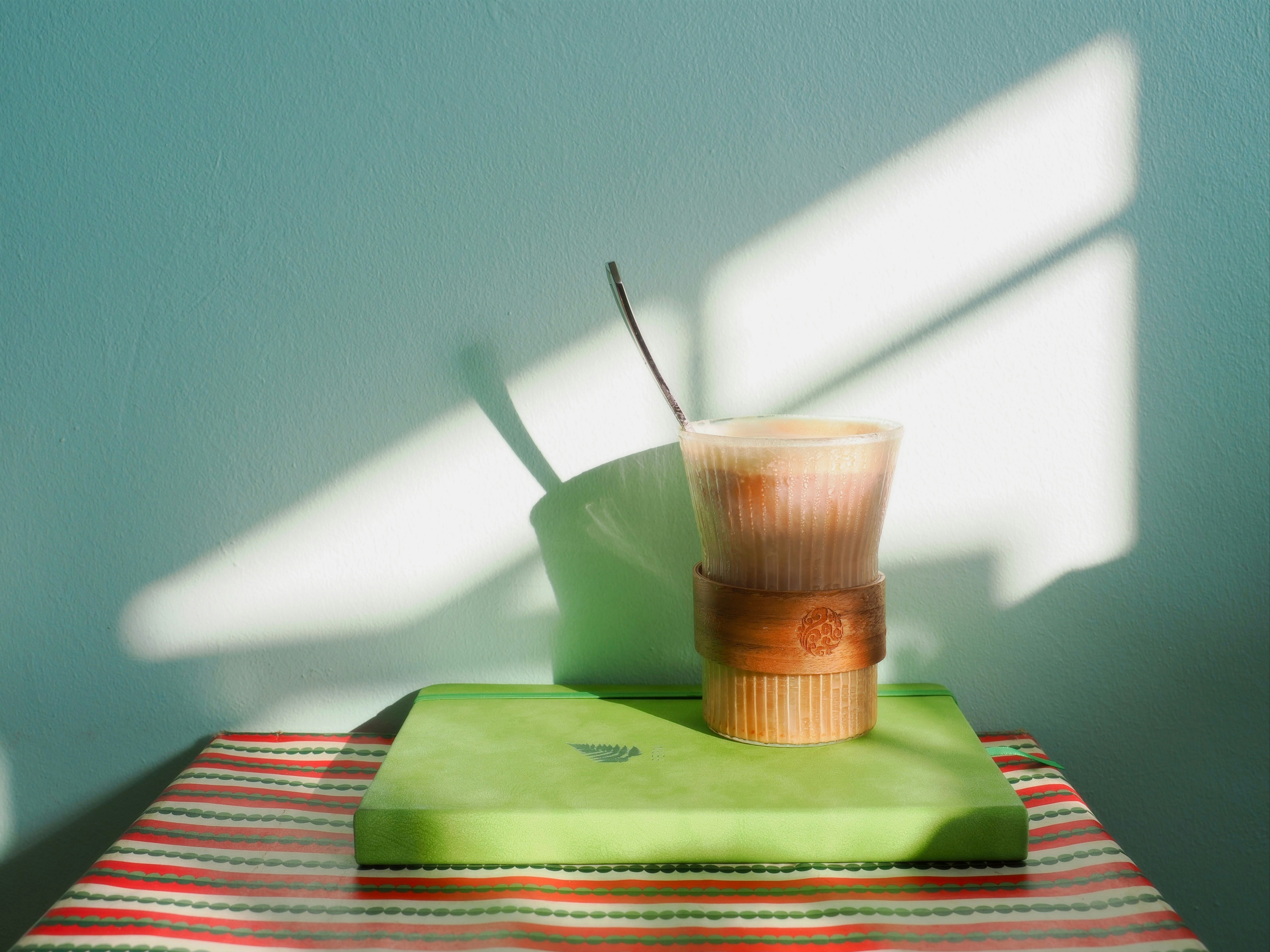 Still Life of a Green Block and Cup with Shadowed Window Light