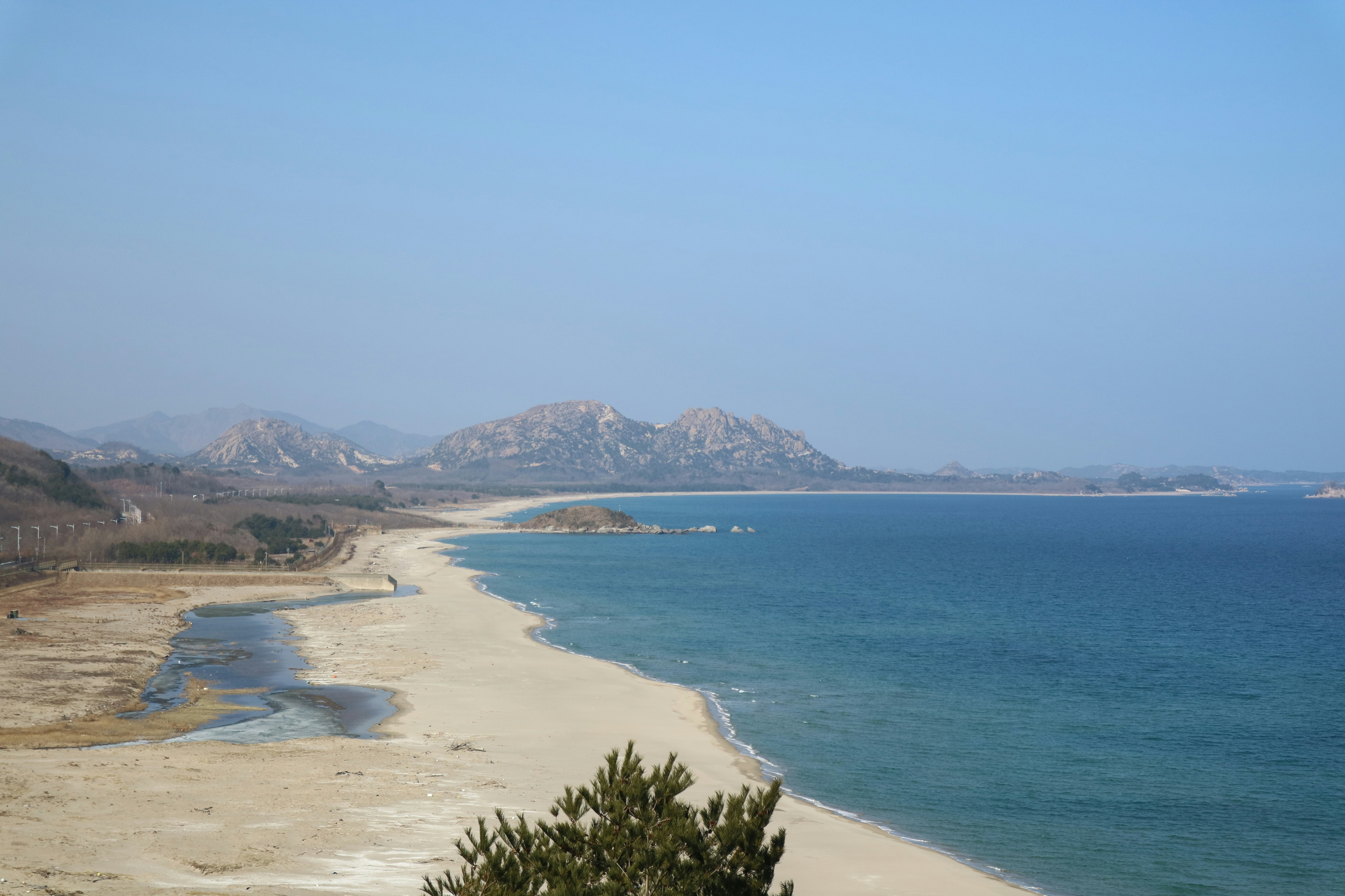 Coastal Ribbon: A Wide Sands and Quiet Sea