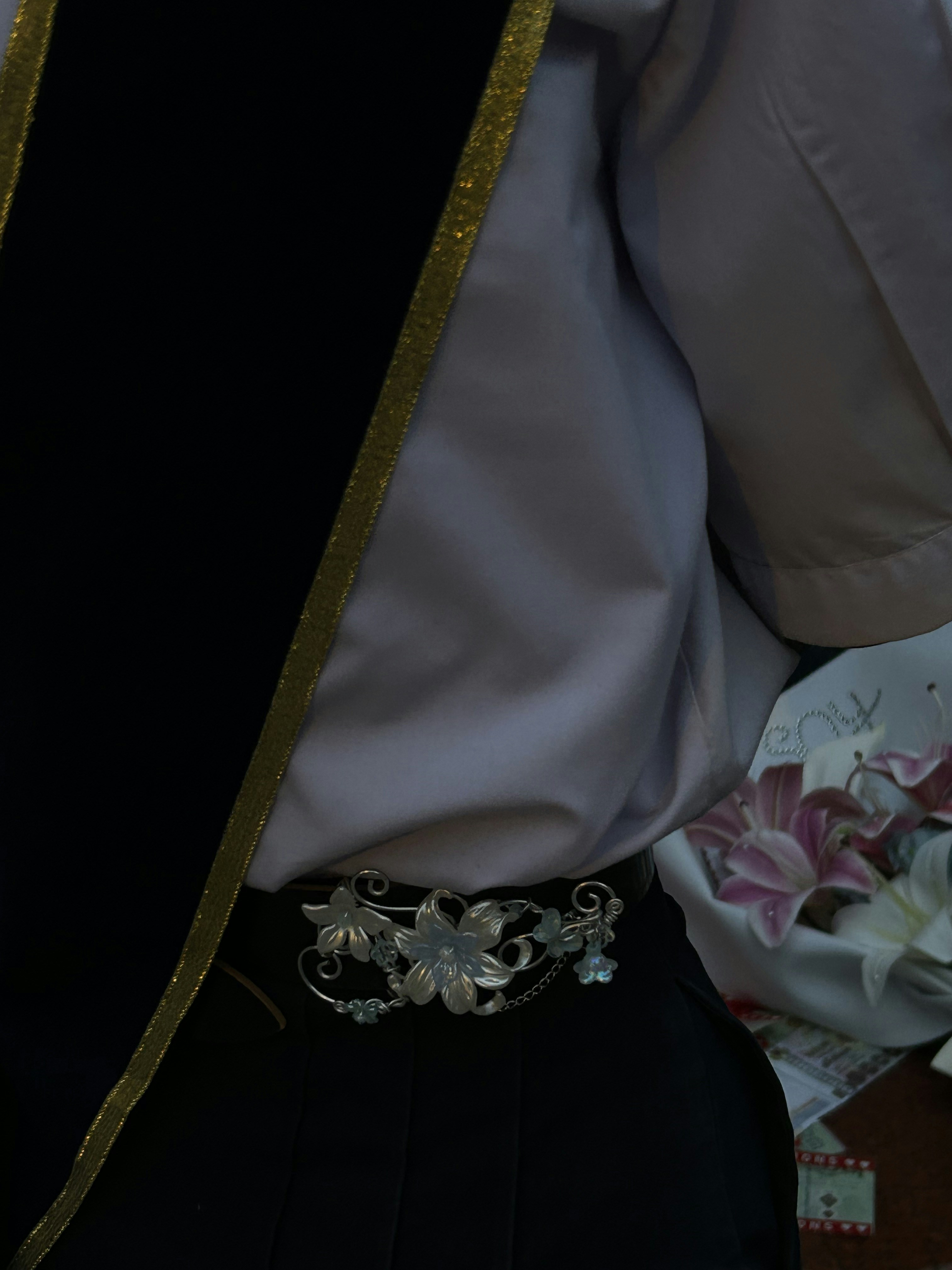 Embellished Waistline: A Velvet Evening with Floral Accents