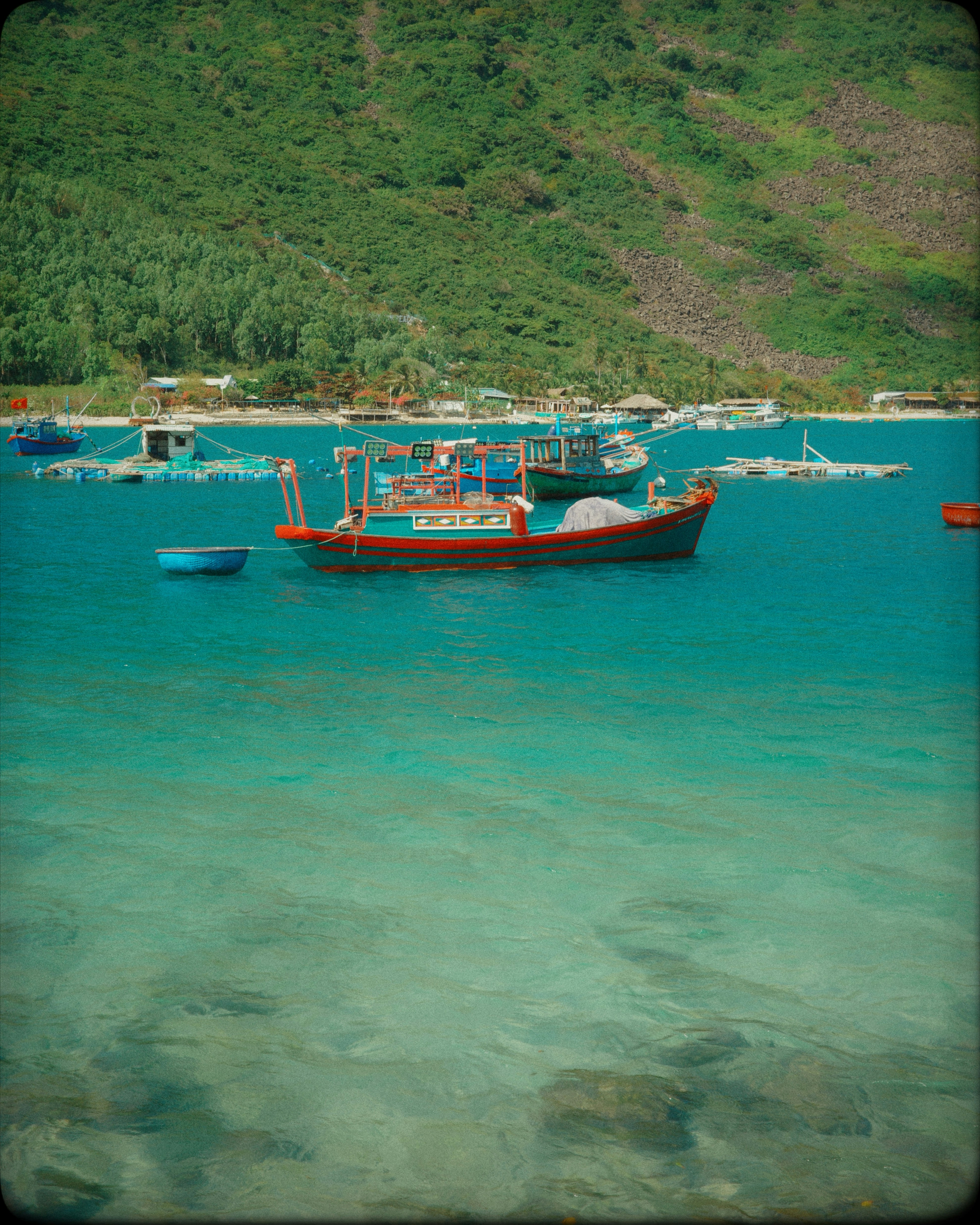 Red Boat at a turquoise Cove