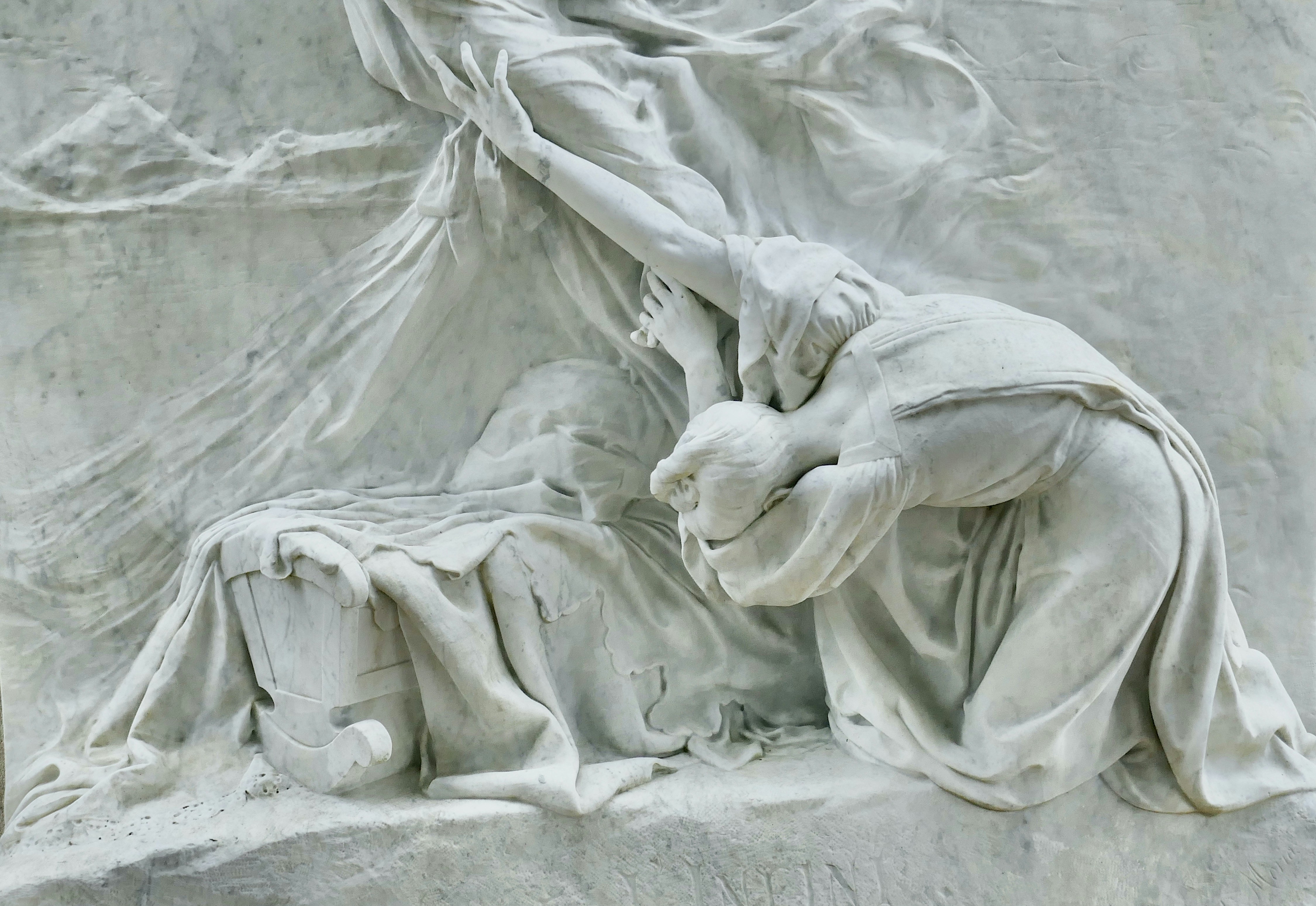 Resting Resolve: A Marble Embrace in Monumental Silence