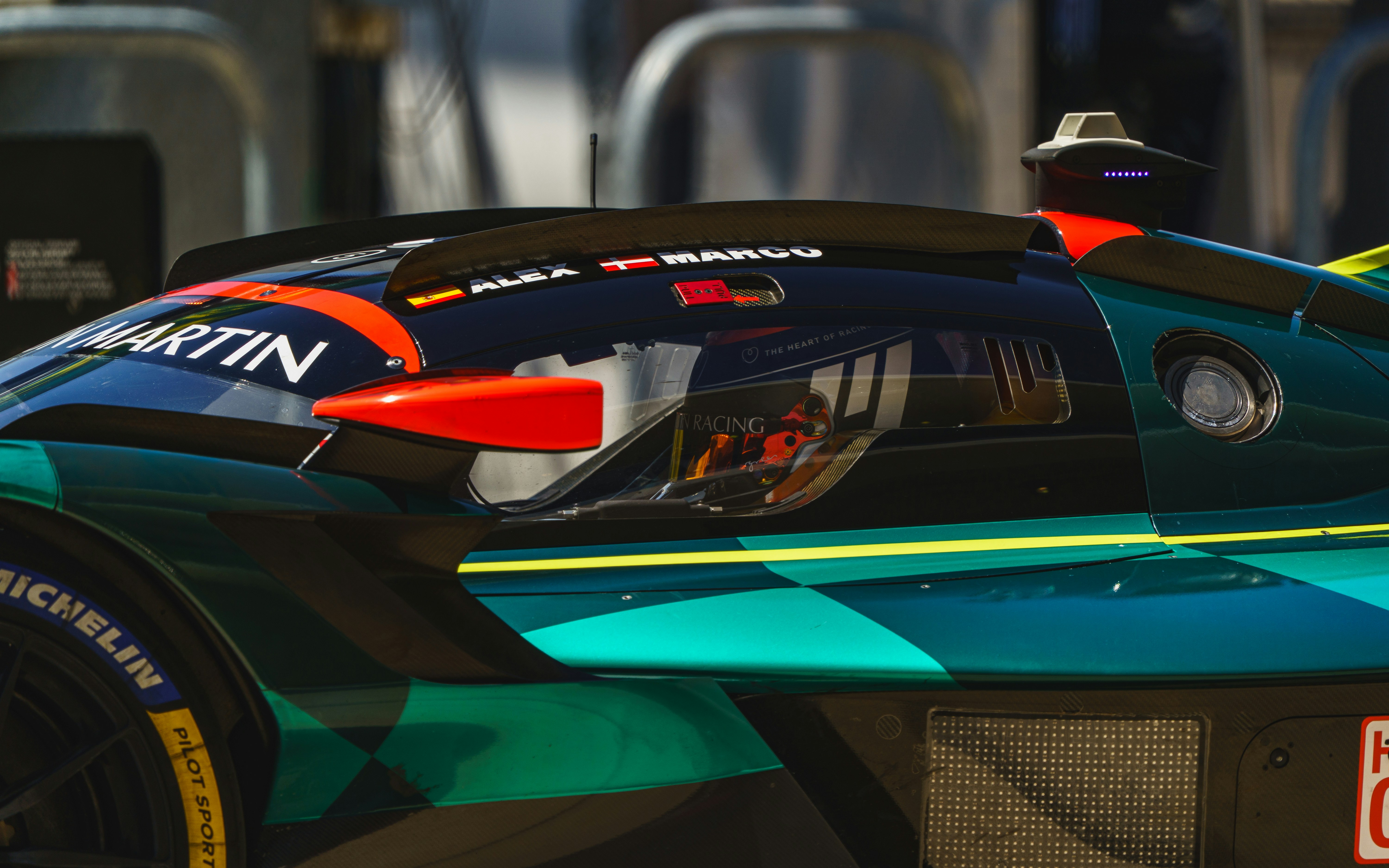 Turbo Teal: A race car’s cockpit in motion