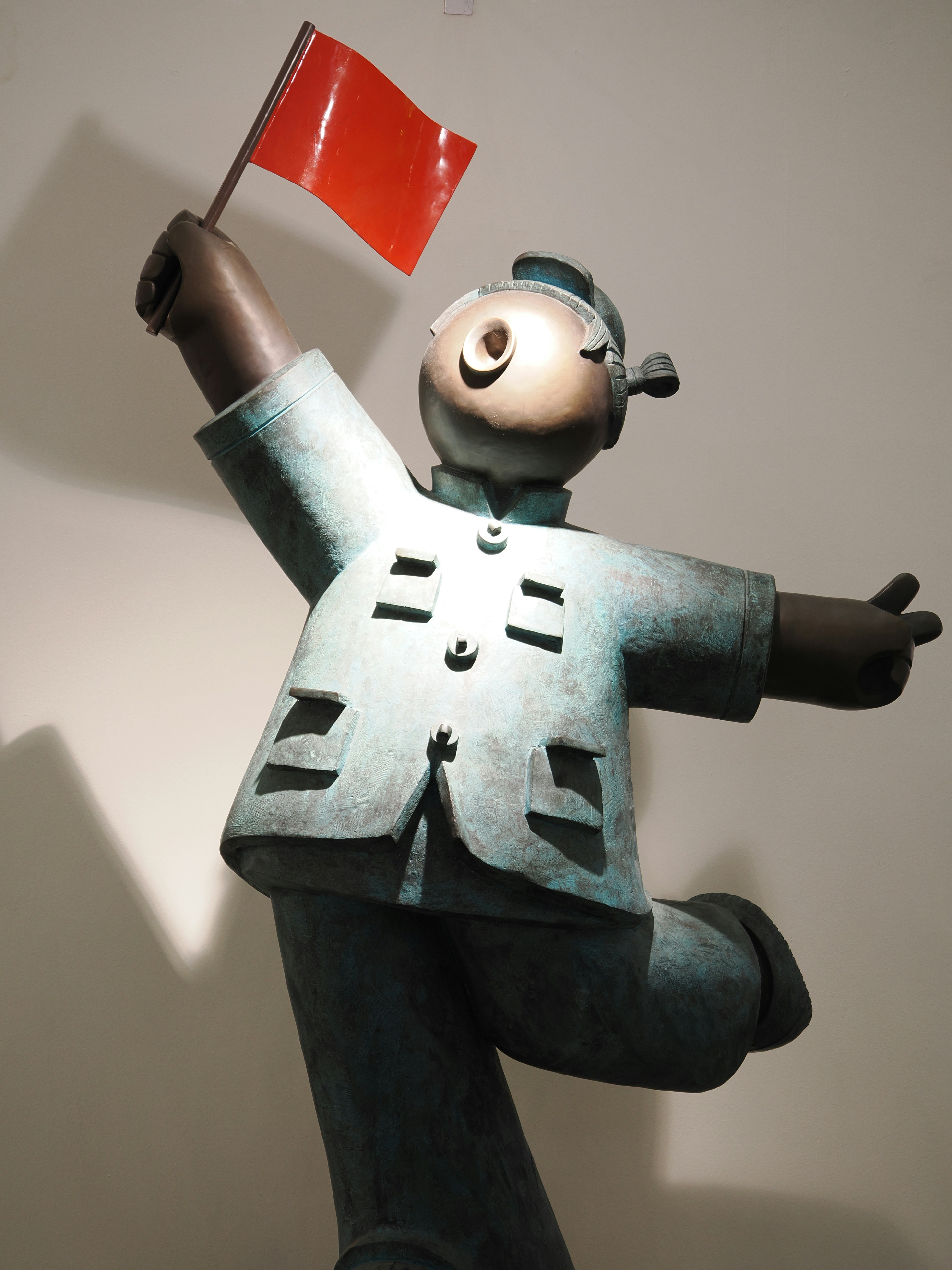 March of the Iron Flag: A Monumental Toy Soldier Elevates its Flag