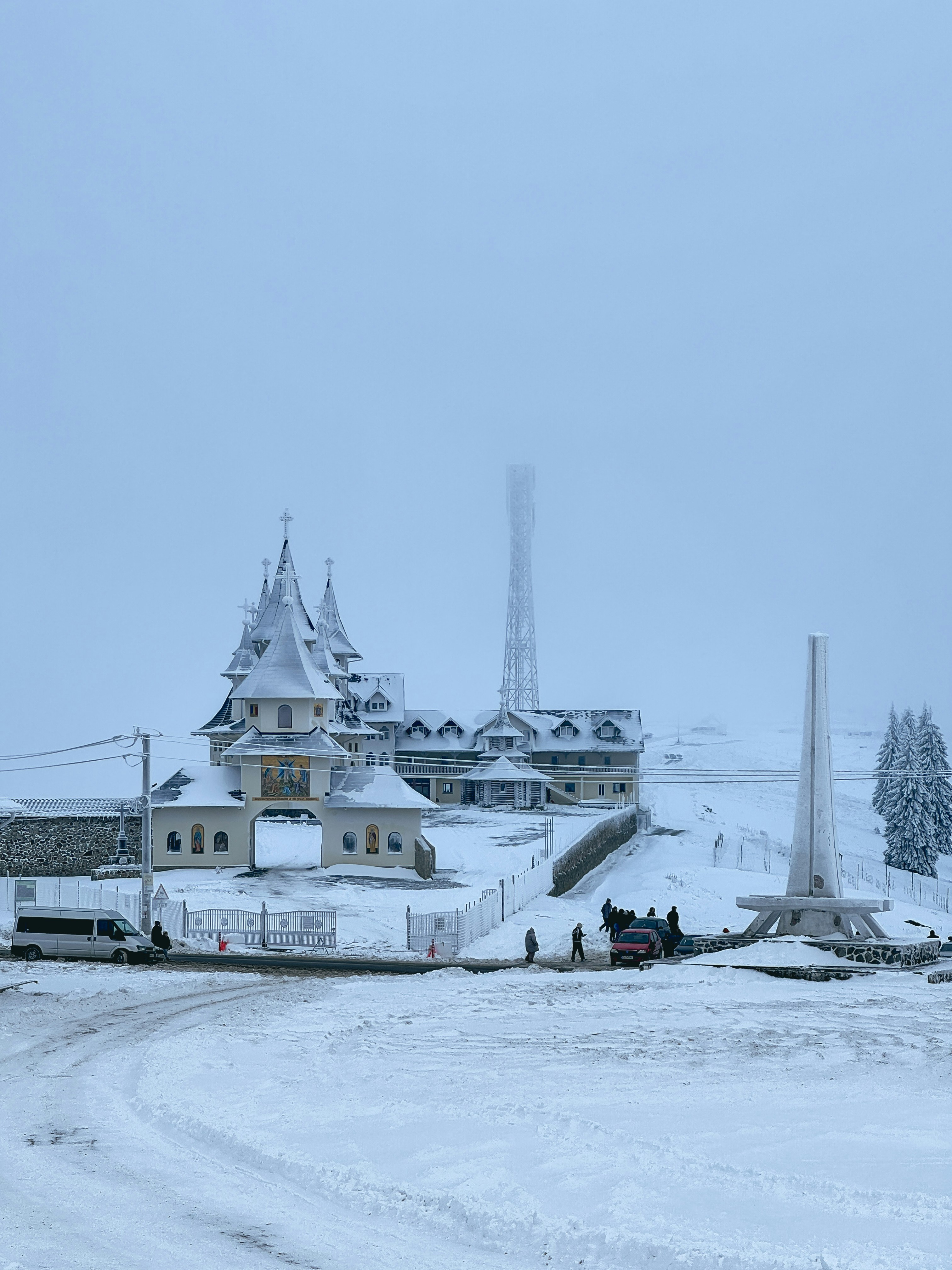 Snowbound Chapel cluster under a pale winter sky