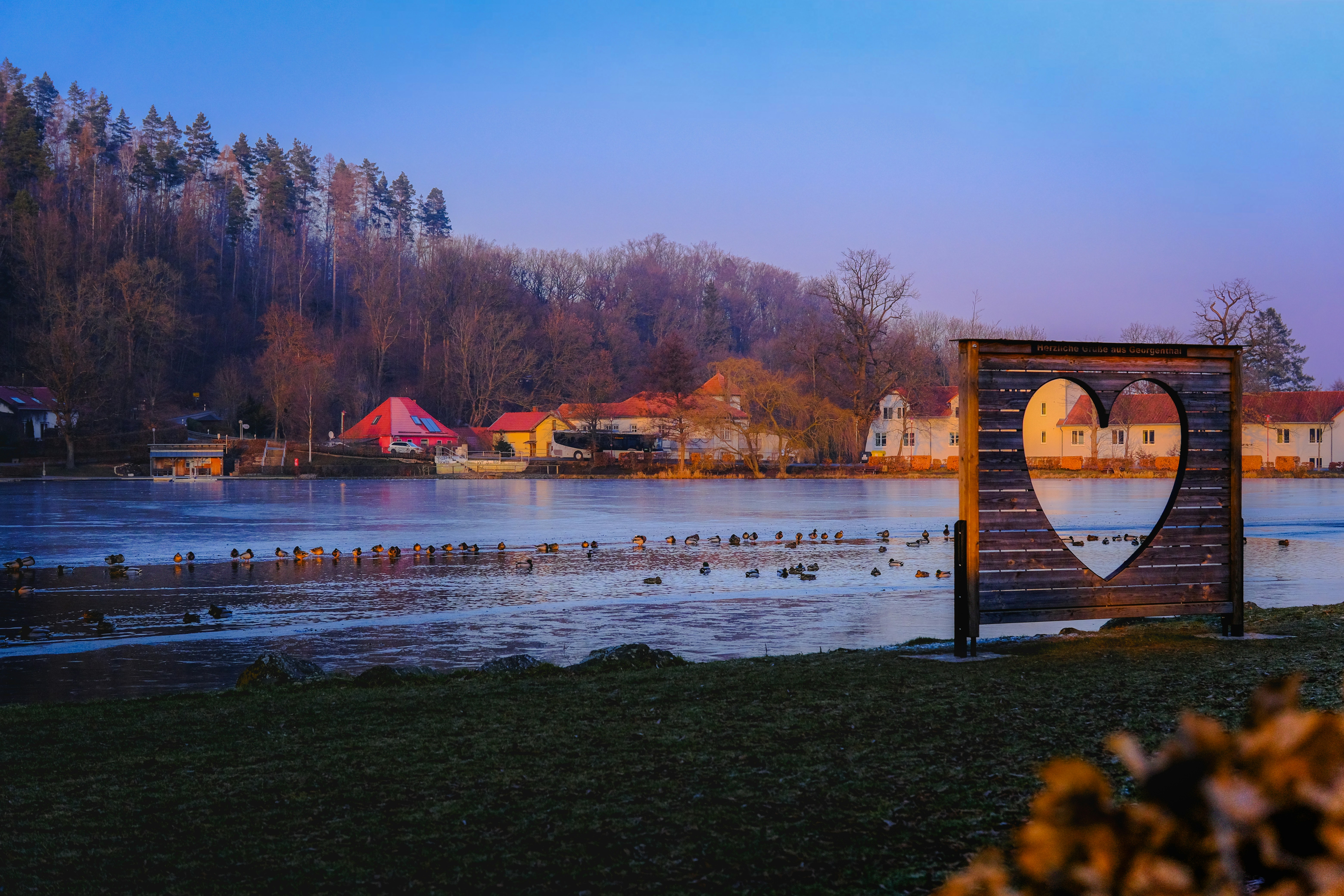 Heart of the Lake: A Painted Structure Framing Reflections