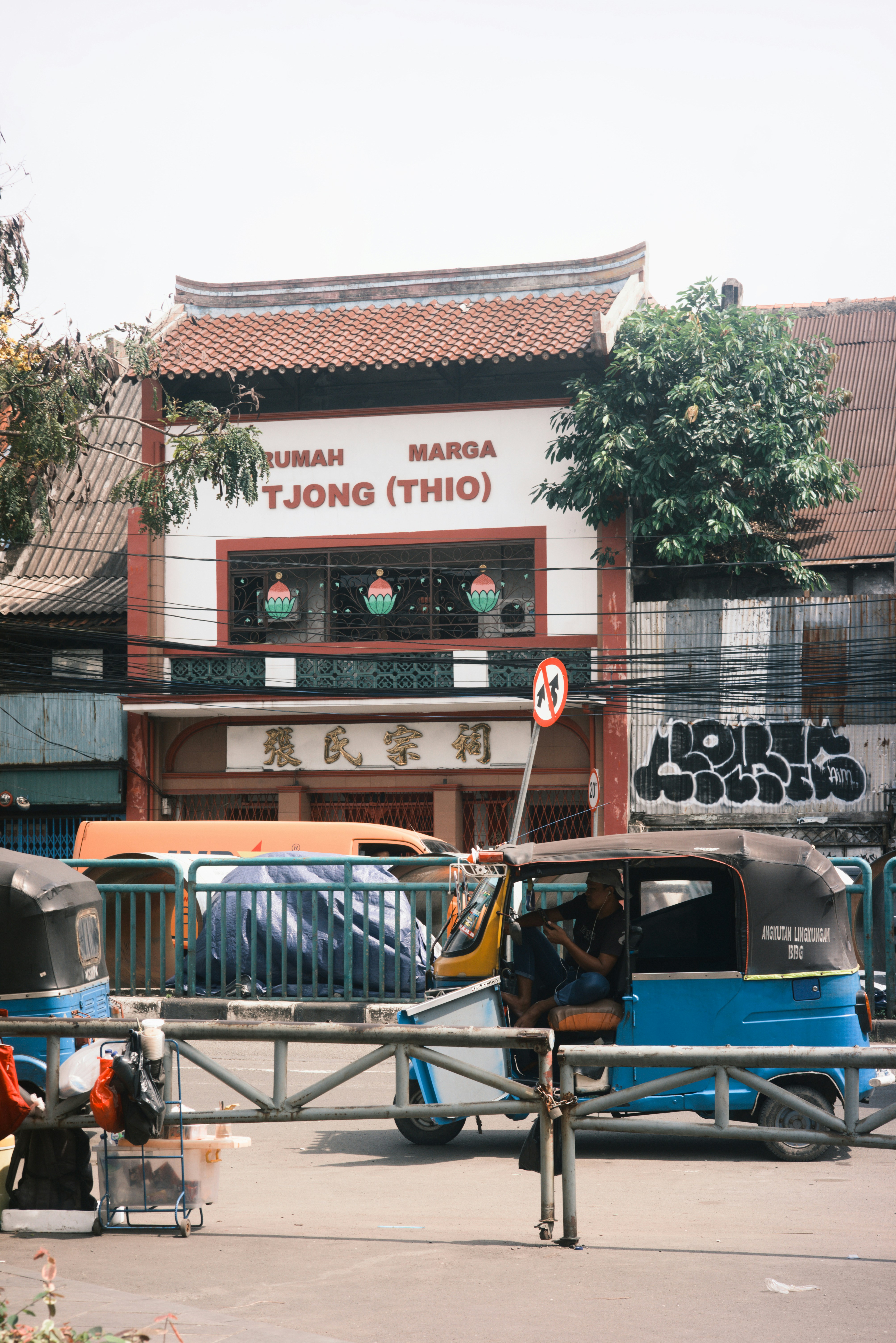 Busiest Streetfront: A Moment Beneath a Templar-Style Roof