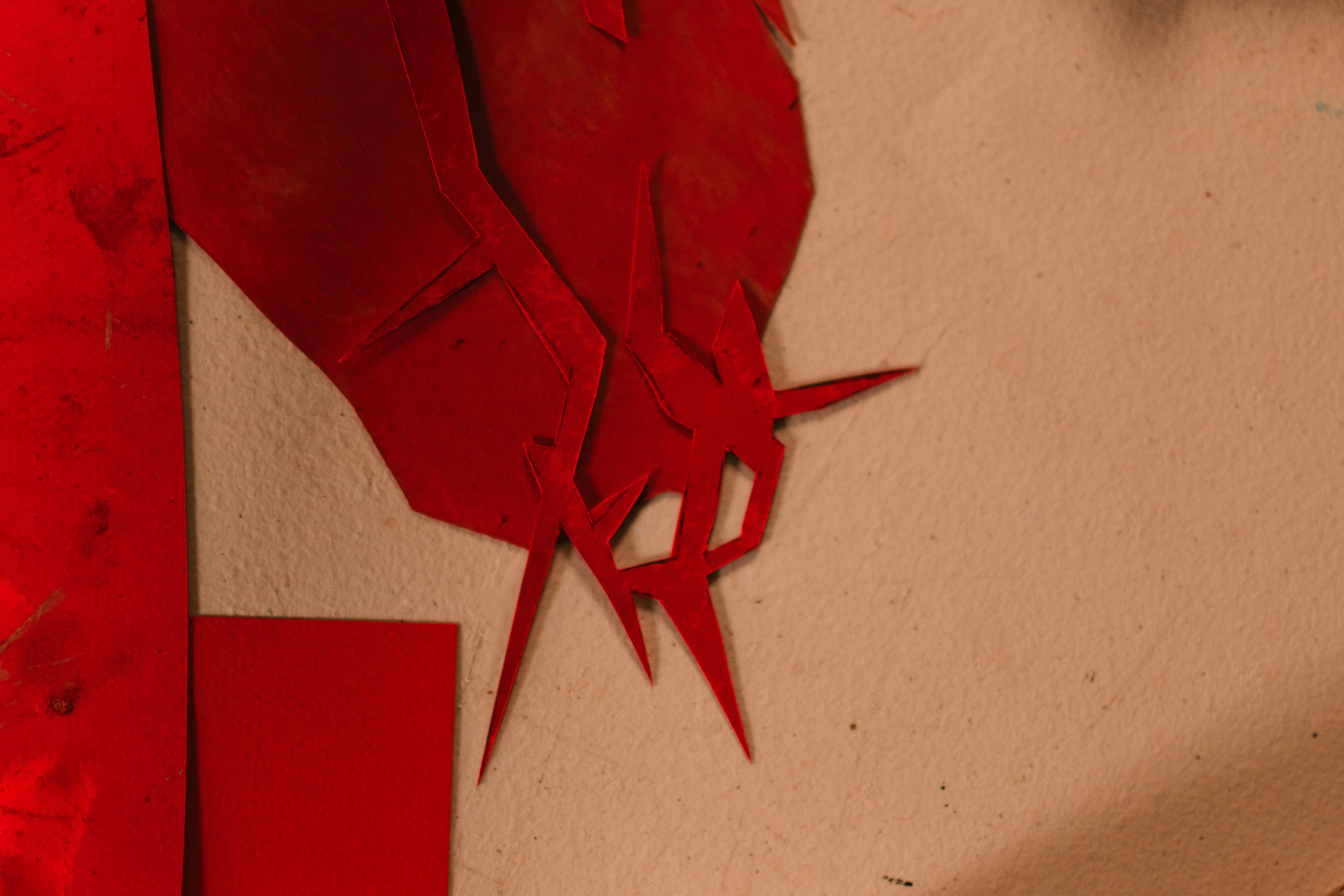 Crimson Shards on a Quiet Wall