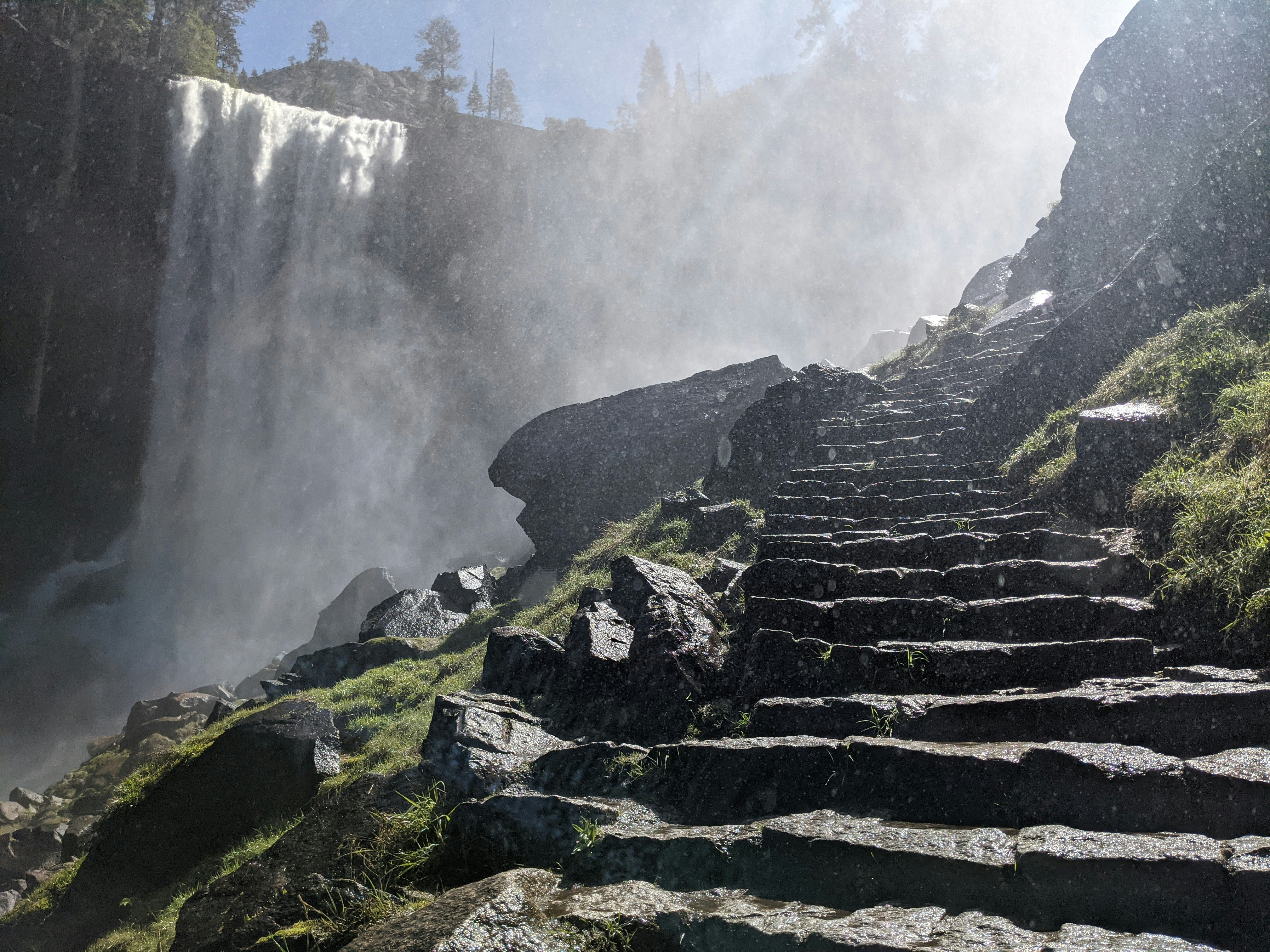 Staircase to the Mist: Granite Steps Beside a Canyon Waterfall