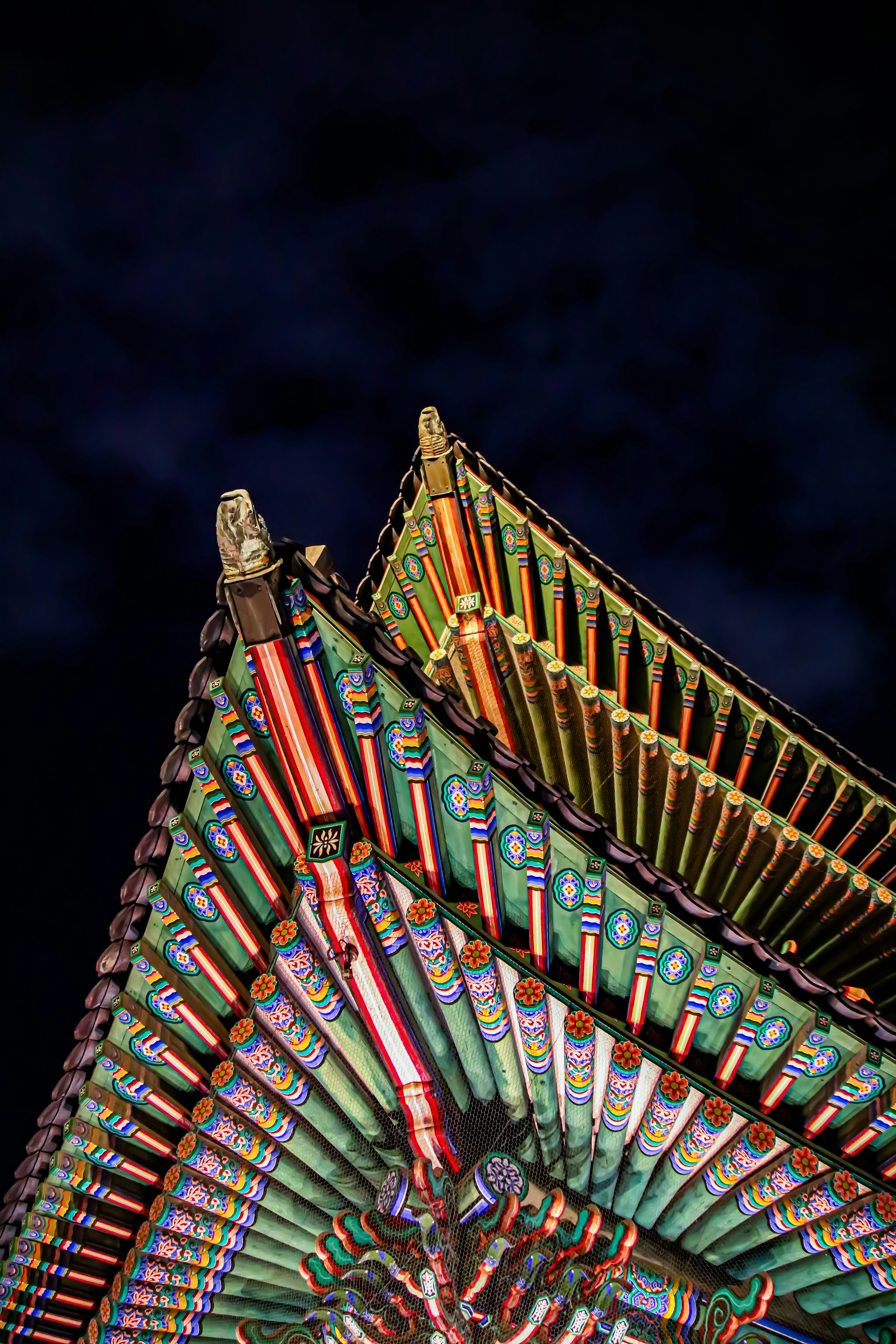 Ceremonial Rooflines: A Kaleidoscope of Colorful Carvings