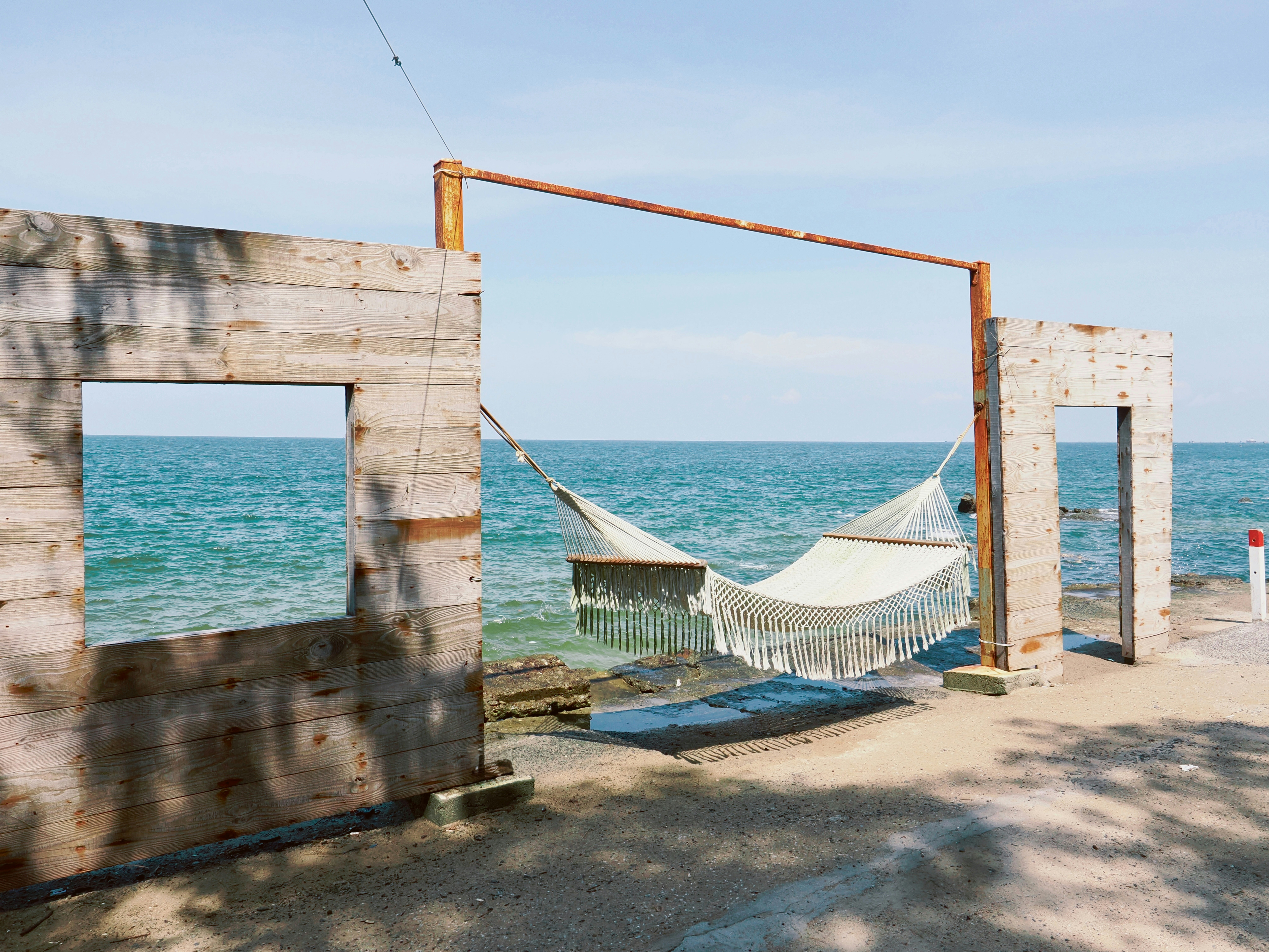 Hammock Between Framing Walls Over Atlantic Sand
