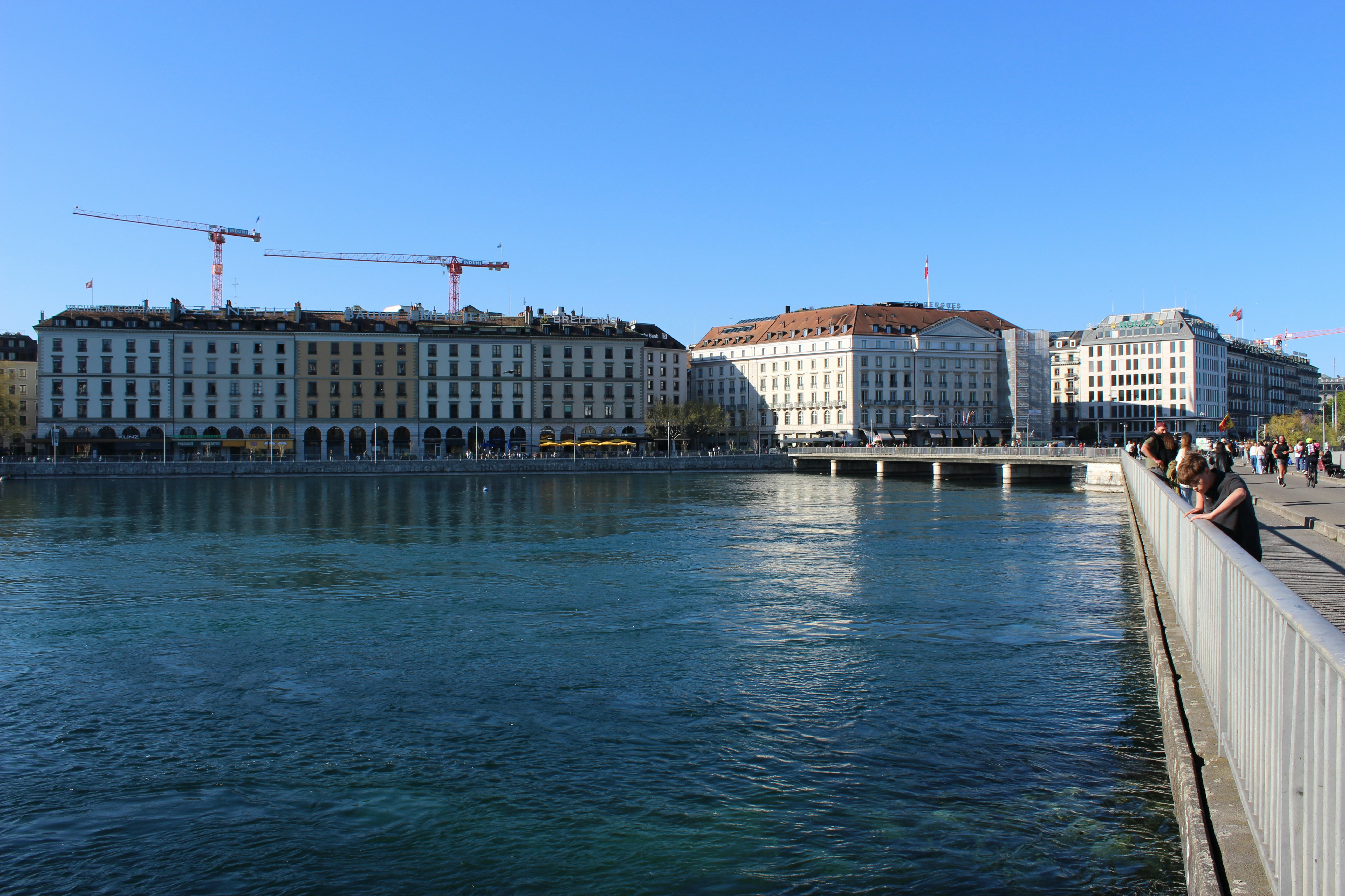 Riverside Row of Historic Waterfront Buildings under a Clear Sky