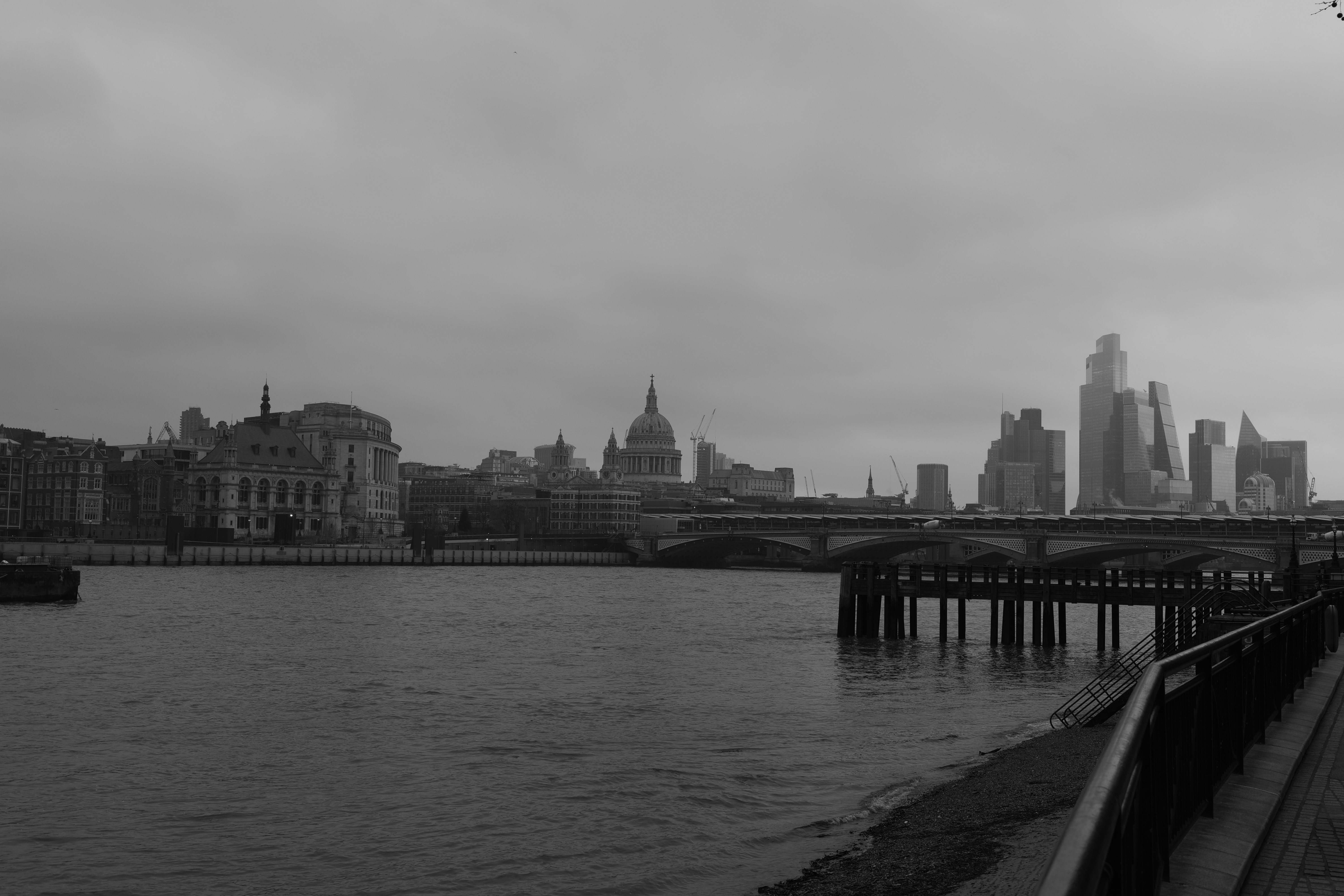 Riverside Cityscape: A Quiet Evening by the Thames