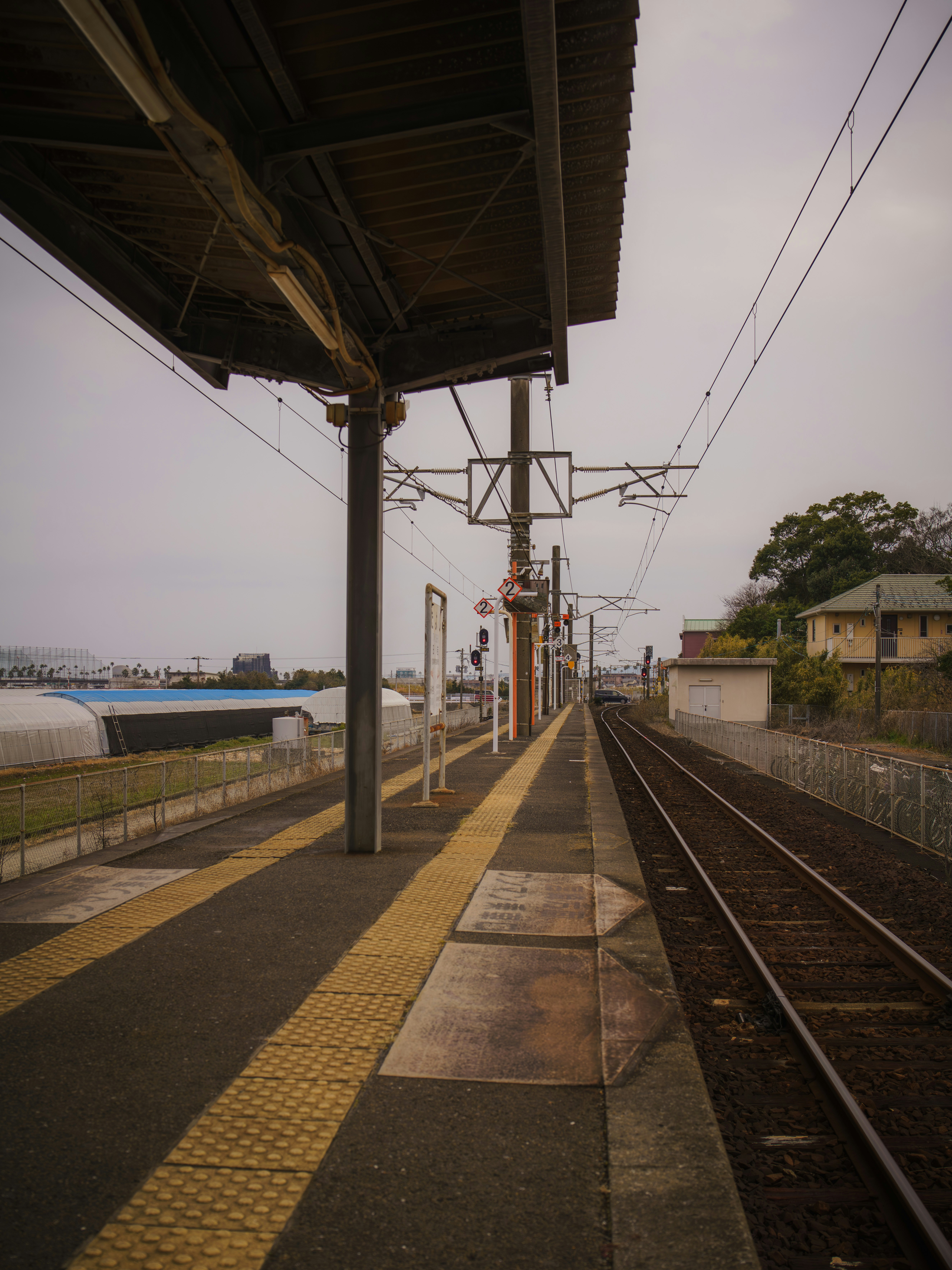 Platform Perspective: Rails Recede Toward a Distant Horizon