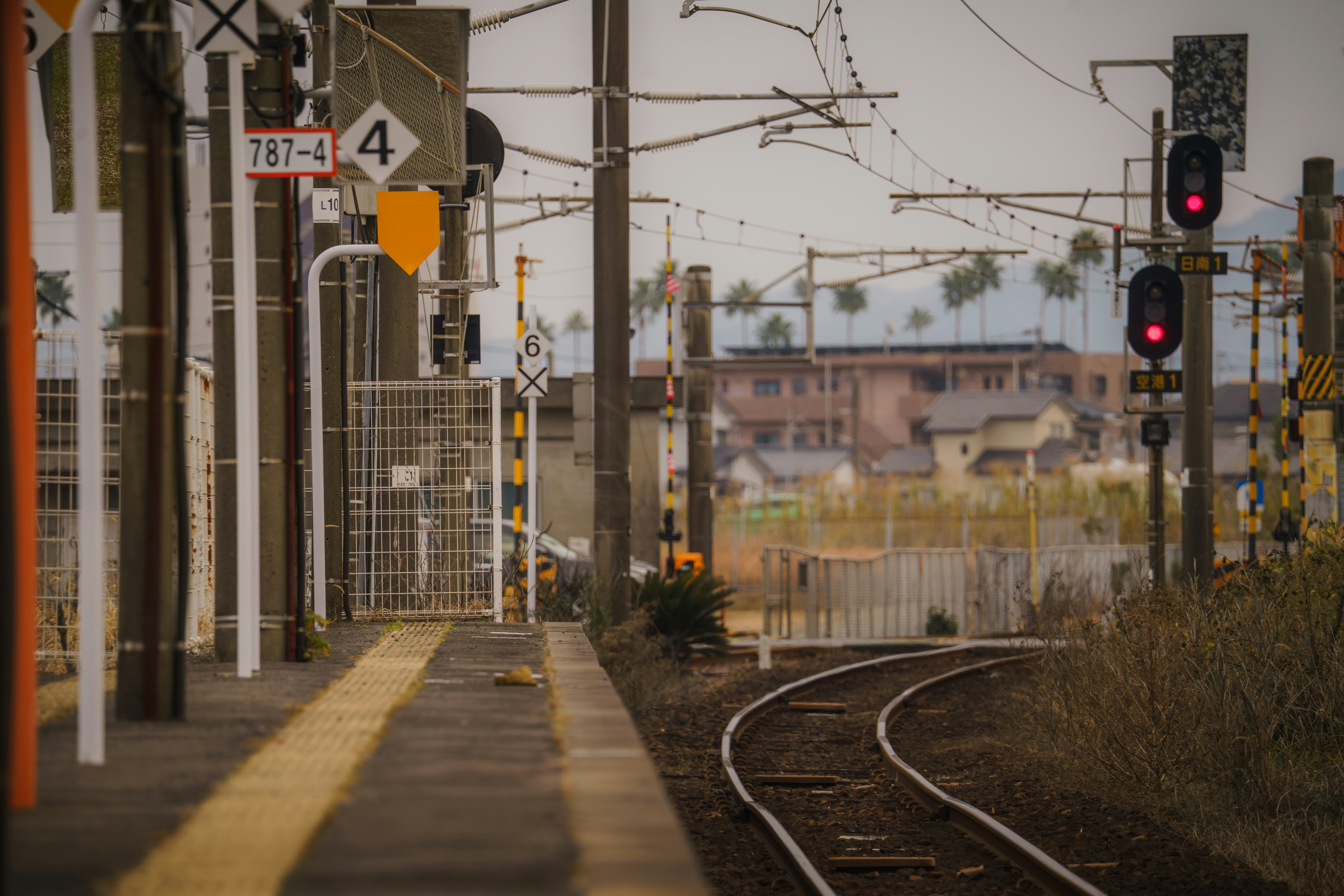End of the Line: Quiet Platform with Distant Tracks