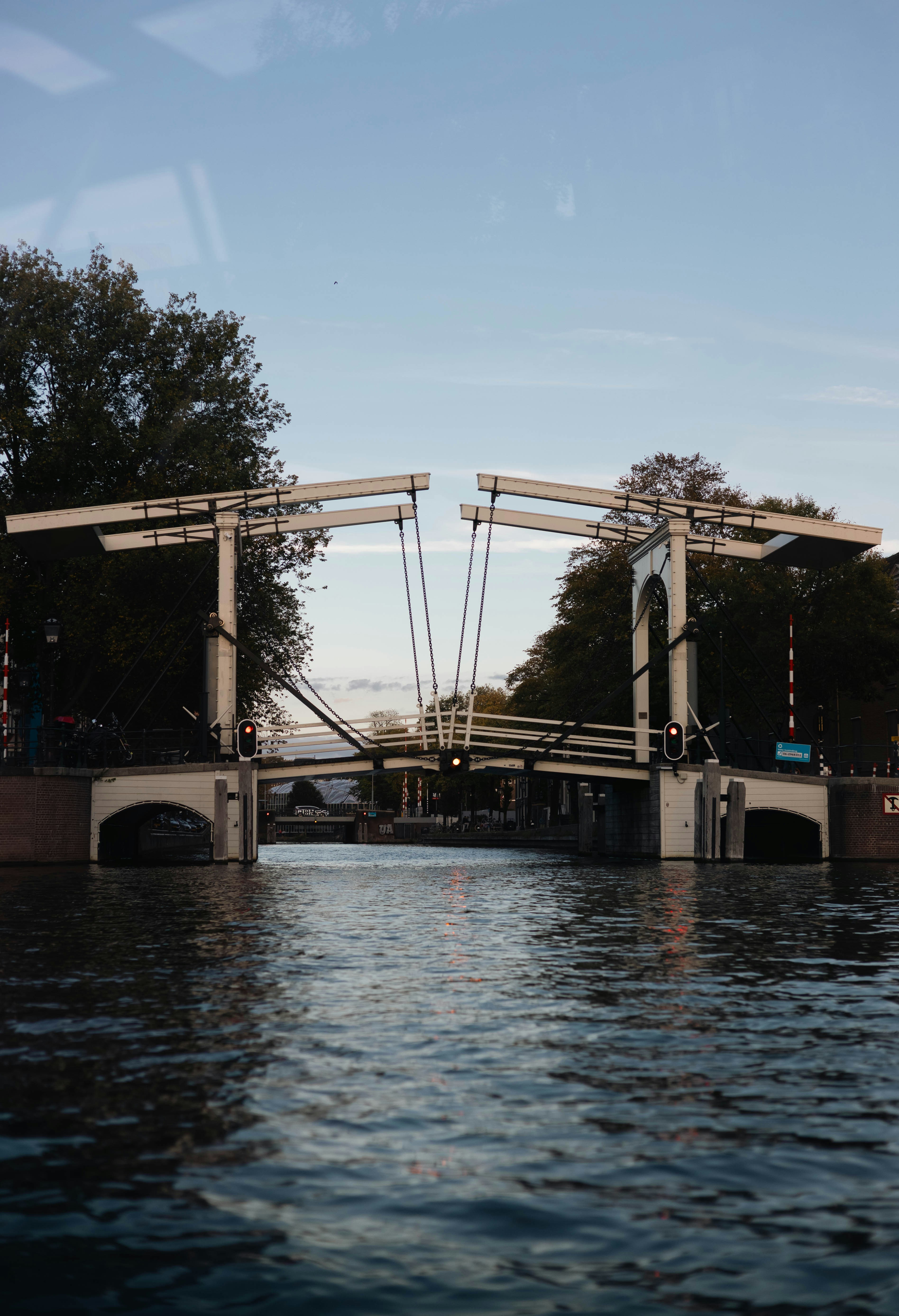 Drawbridge Horizon: Calm Water under a City Gateway