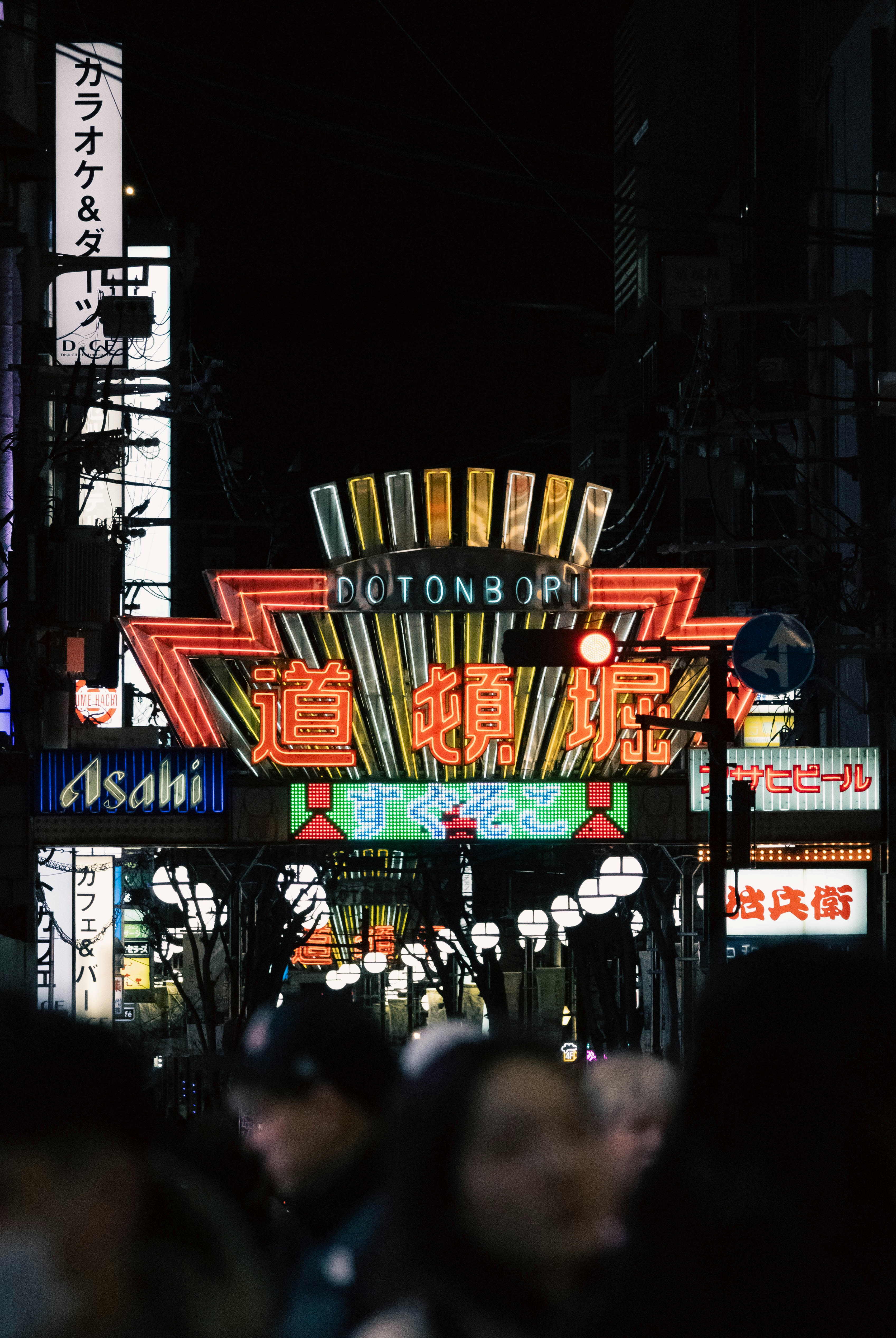 Neon Gate of Dotonbori: Lights Over the Crowded Street