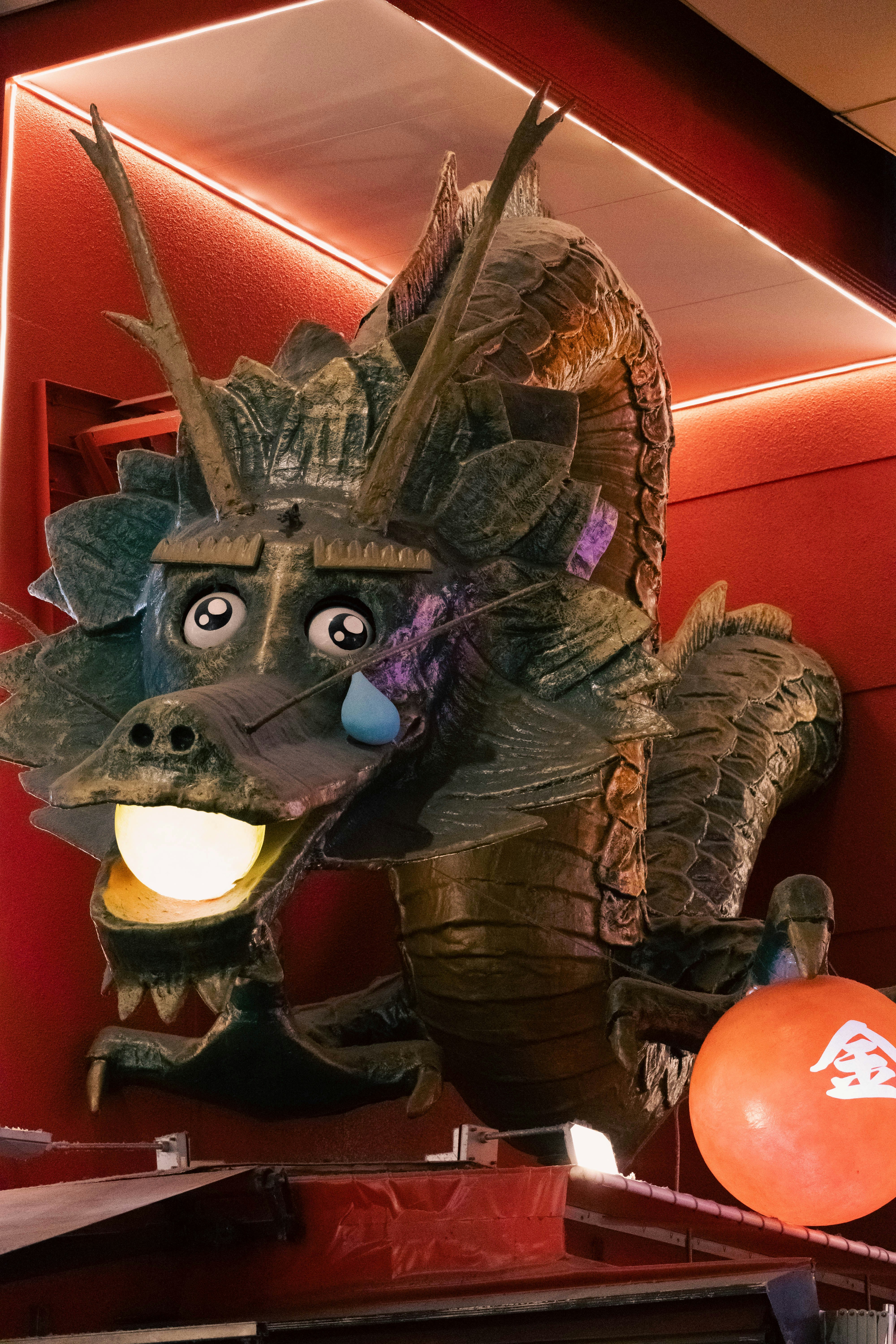 Dragon Mascot Under Warm Neon Glow