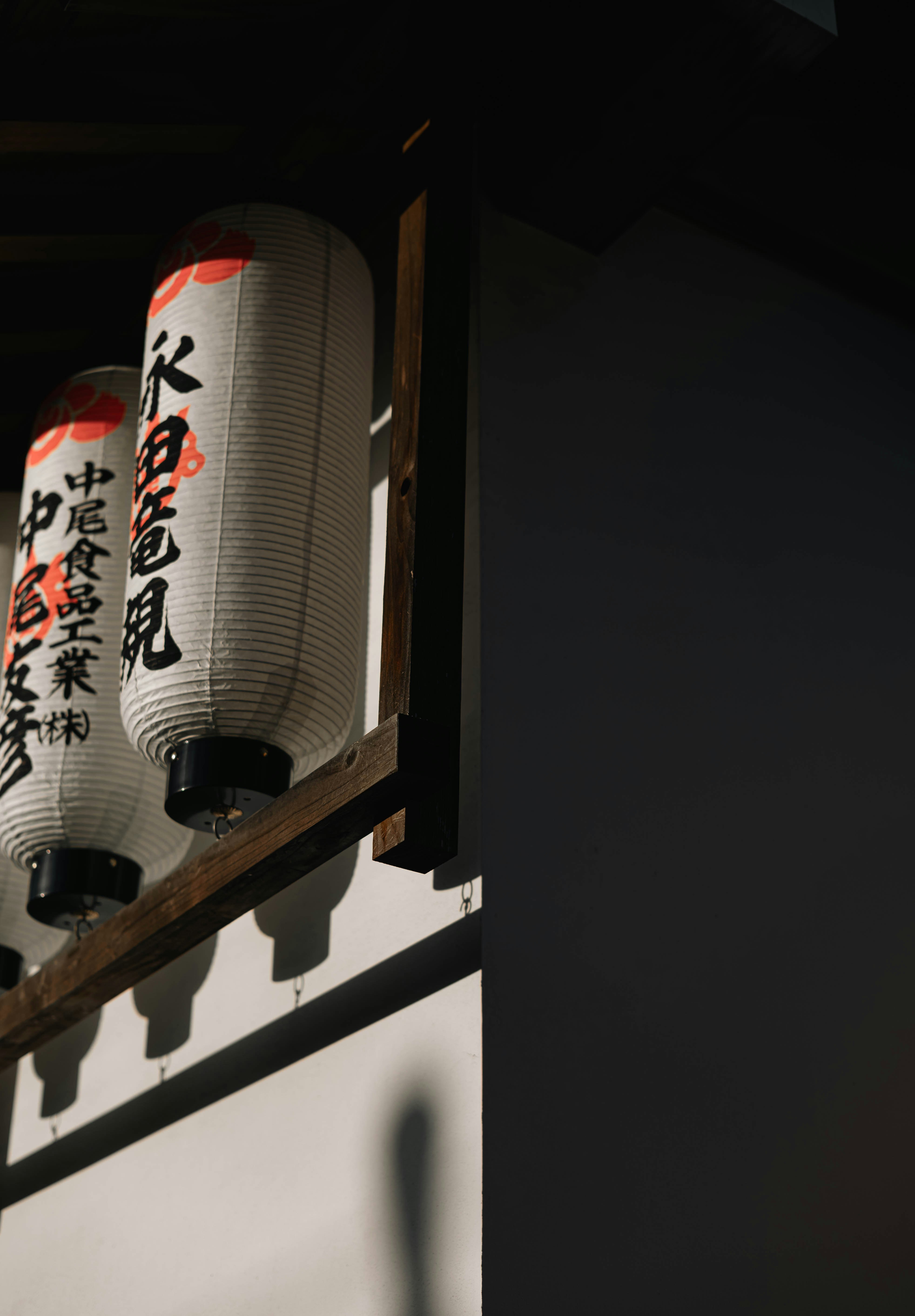 Lanterns in shadow: a quiet corridor of Japanese light
