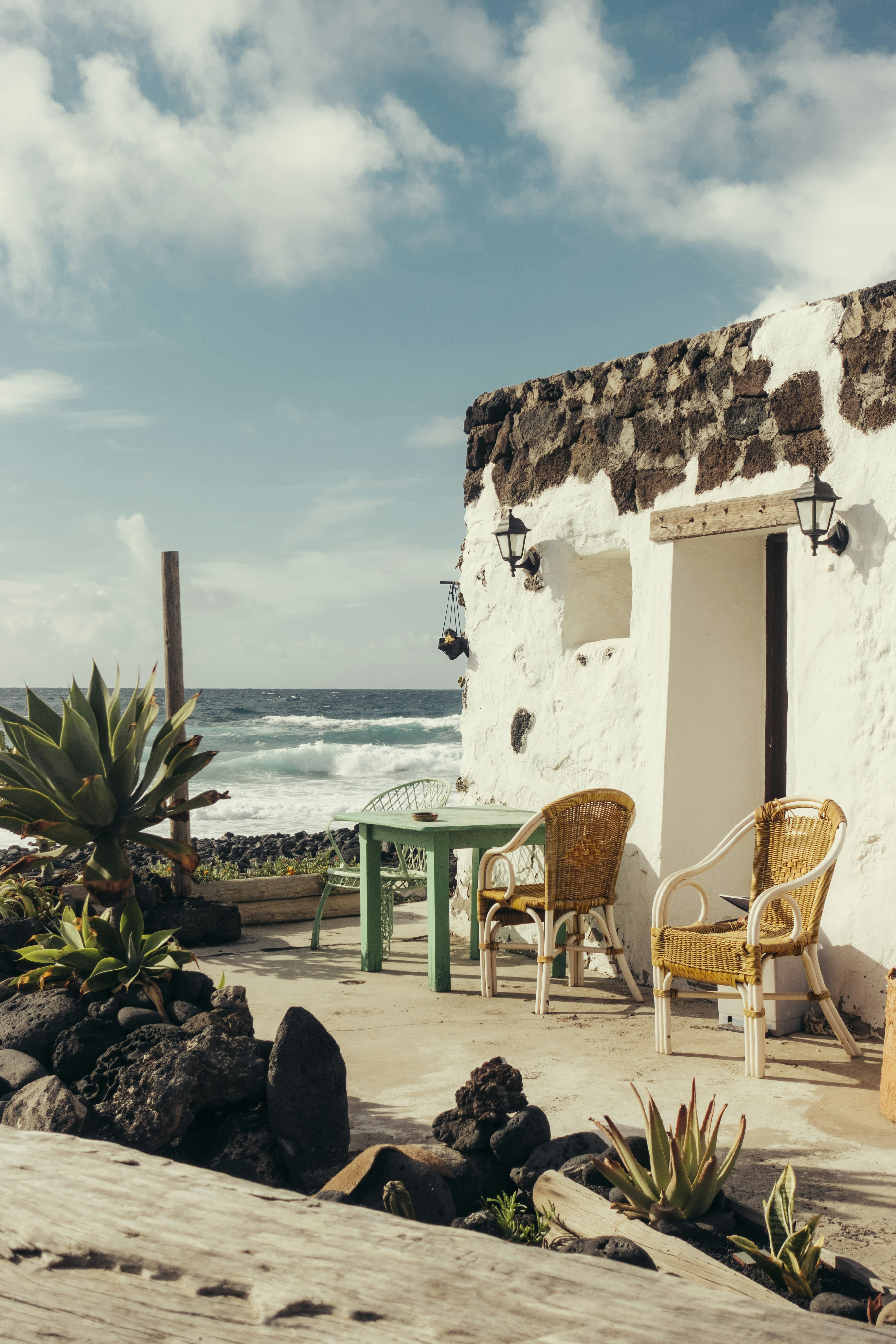 Terrace by the Sea: A Sunlit Reef of wicker and Whitewashed Walls