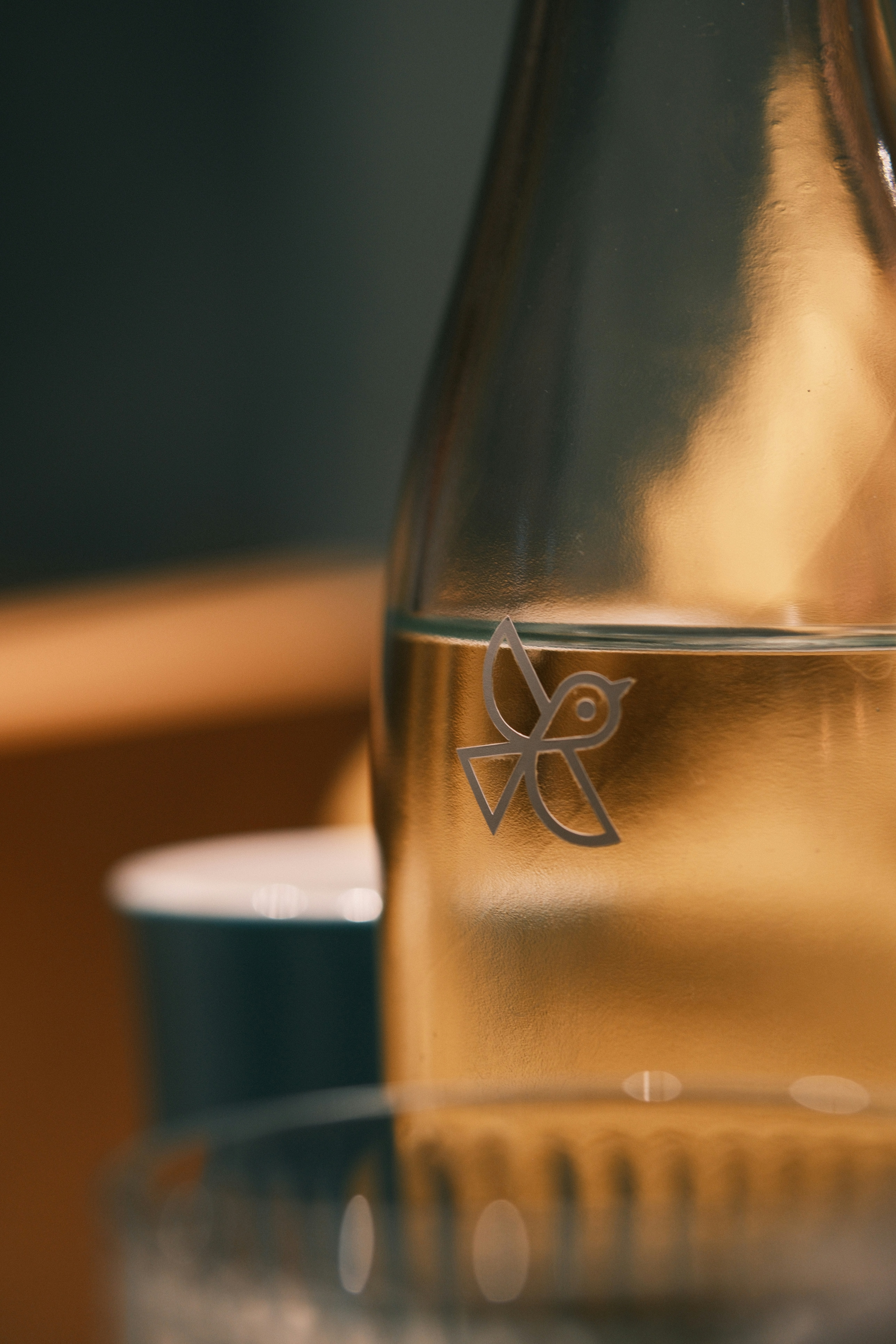 Glassy Gold: A Close Moment with a Bottled Pause