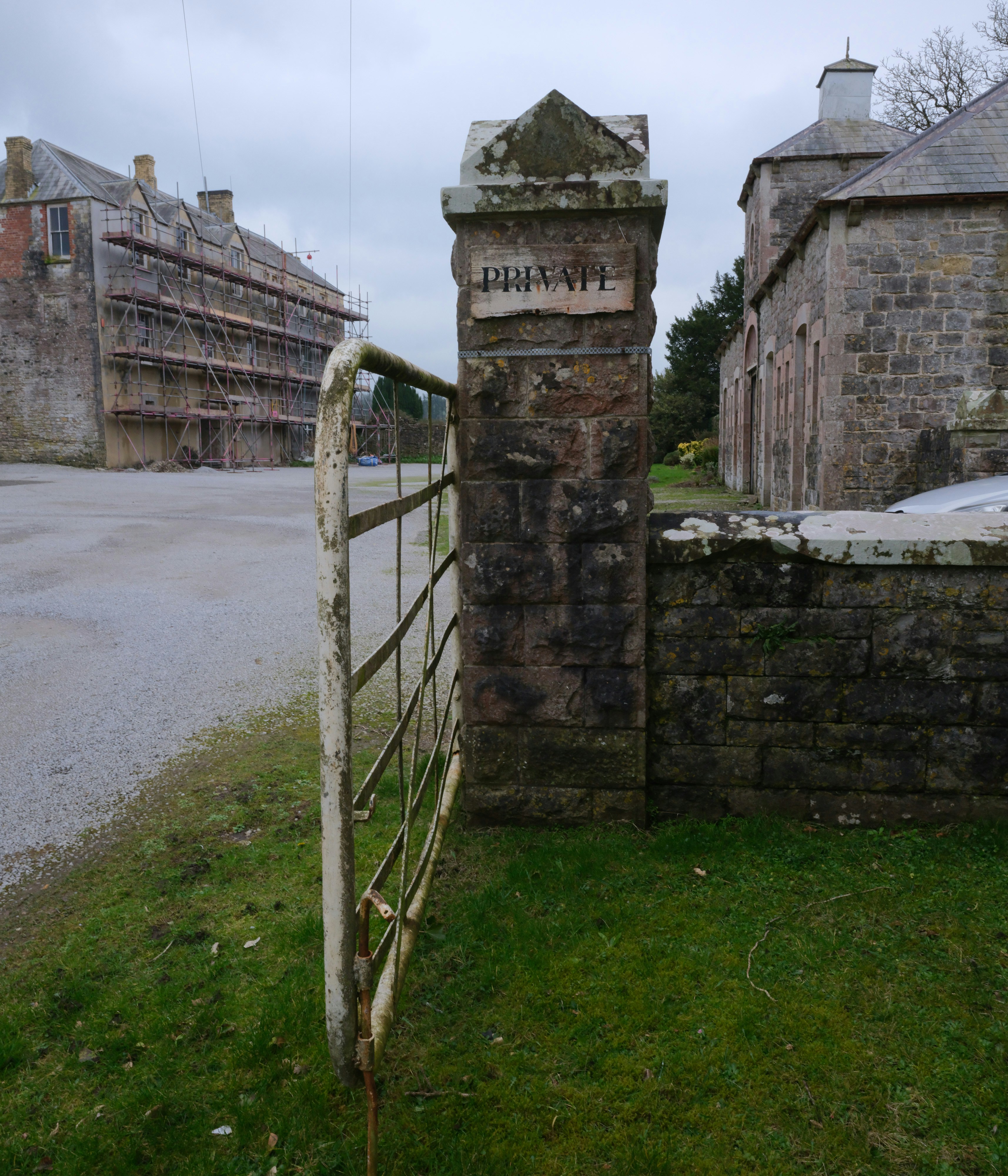 Weathered Gate to a Quiet Village Square