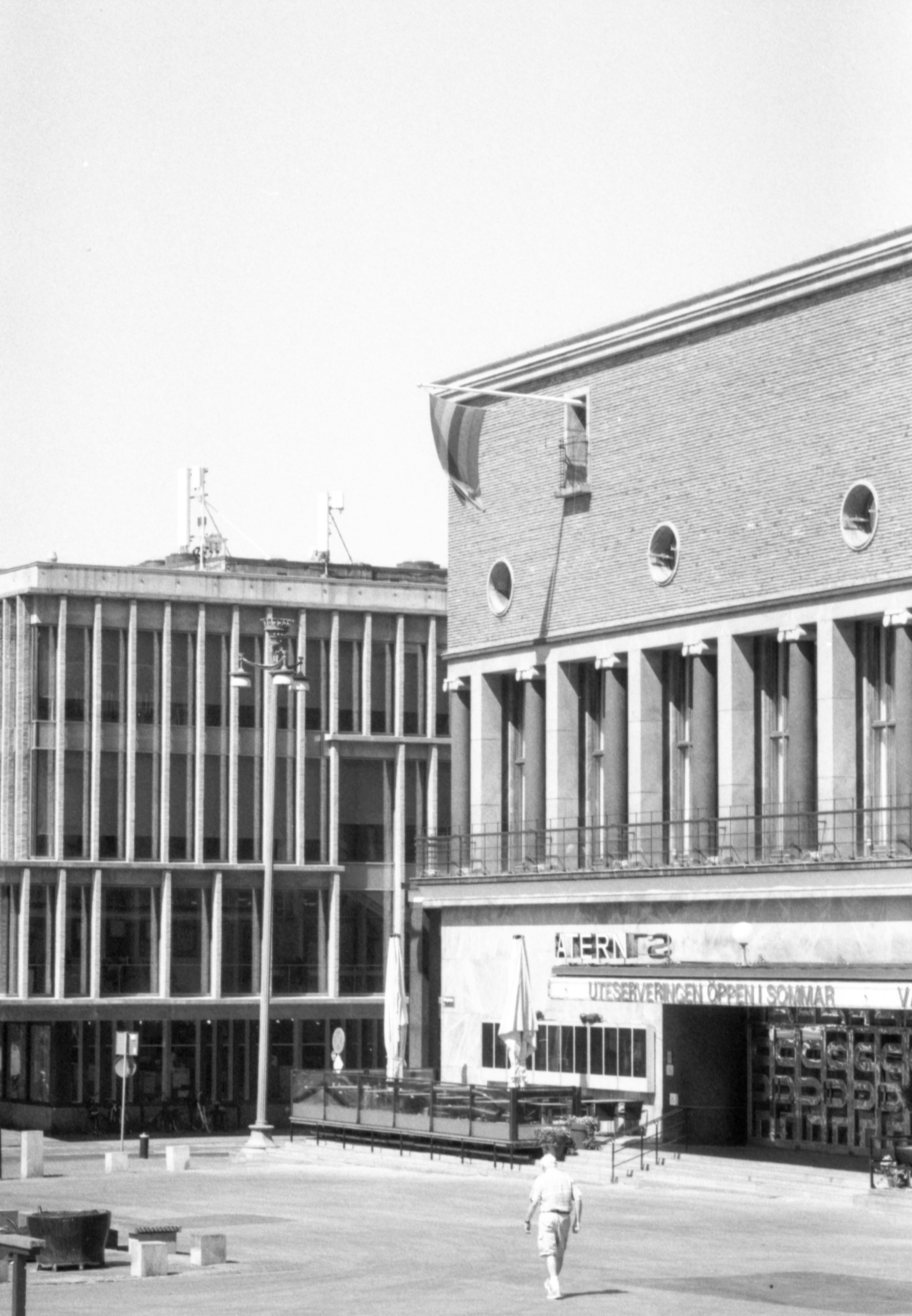 Modern buildings with a person walking in foreground