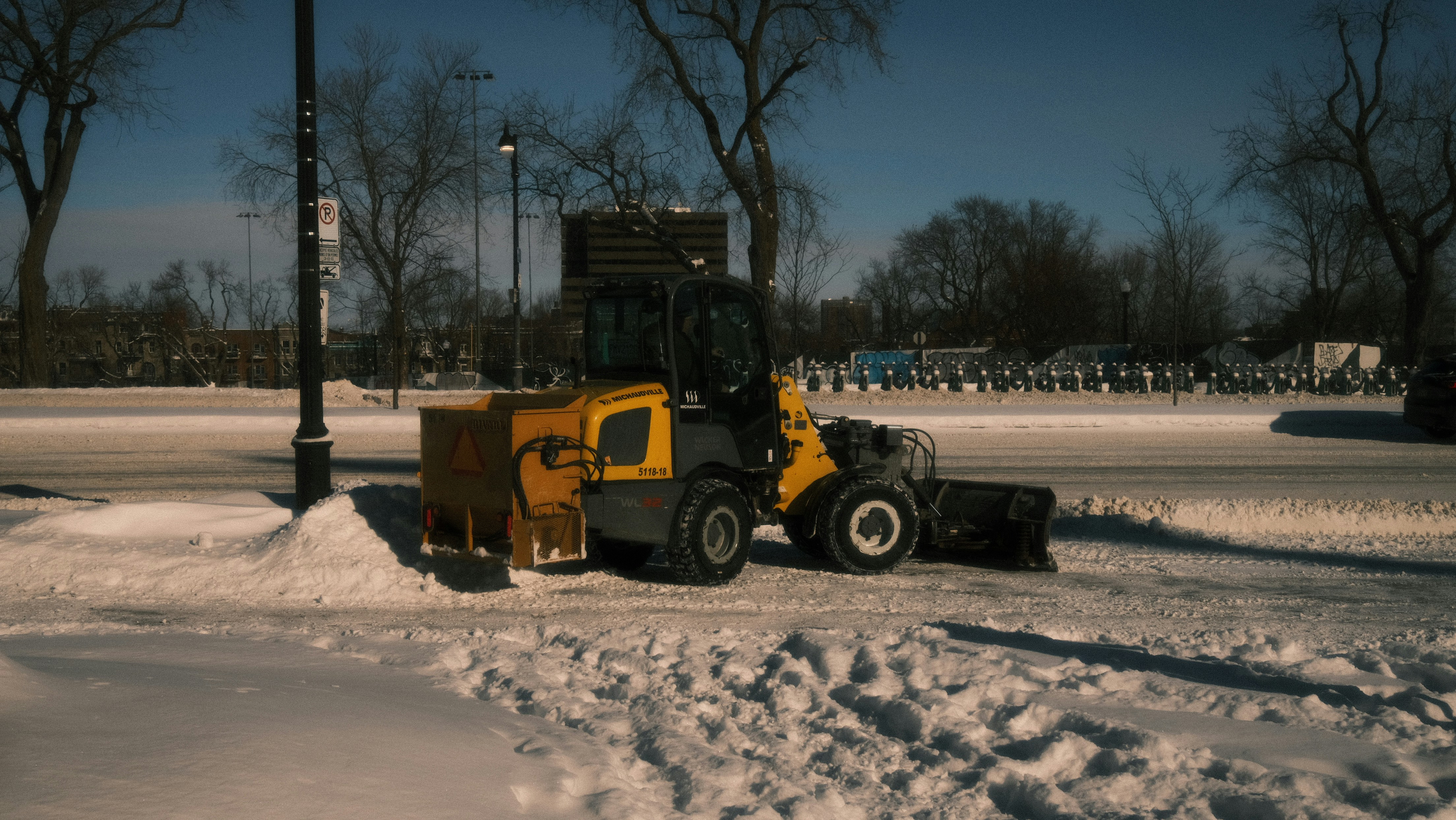 Snow-Clearing Machine on a Quiet Winter Avenue