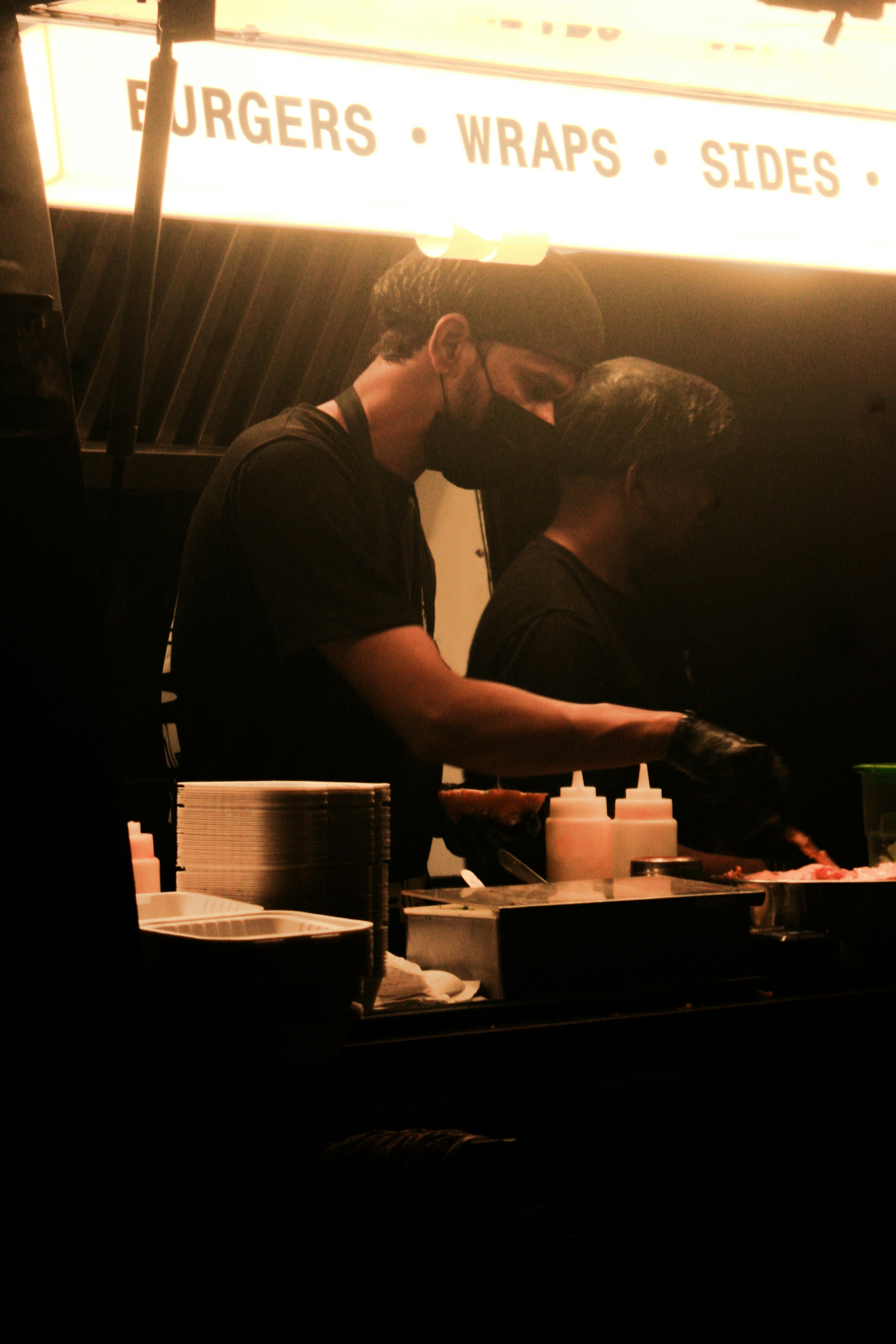 Late-Night Grill: Behind the Counter in Warm Amber Light
