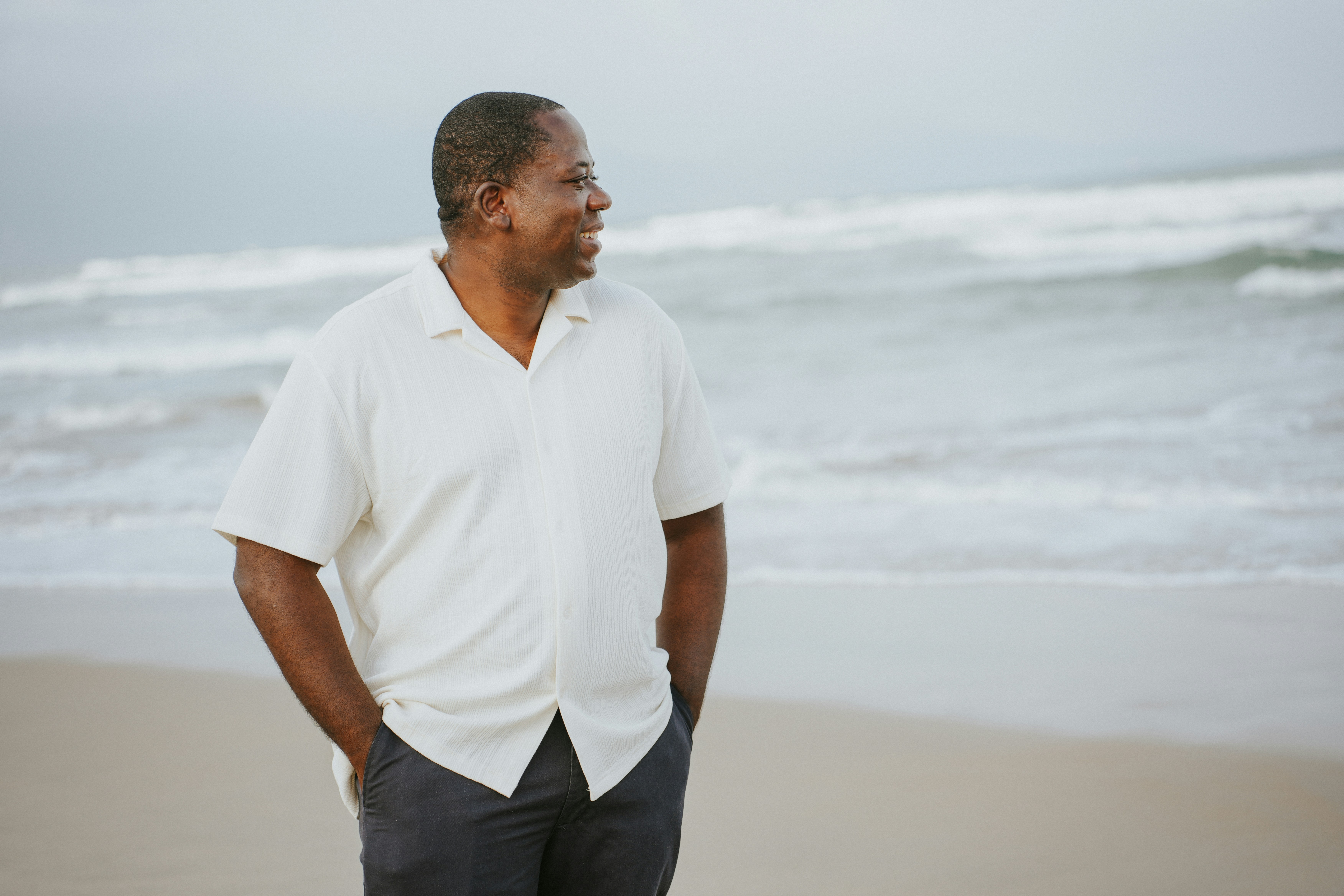 Coastal Contemplation: A Seaside Moment with a Figured Calm