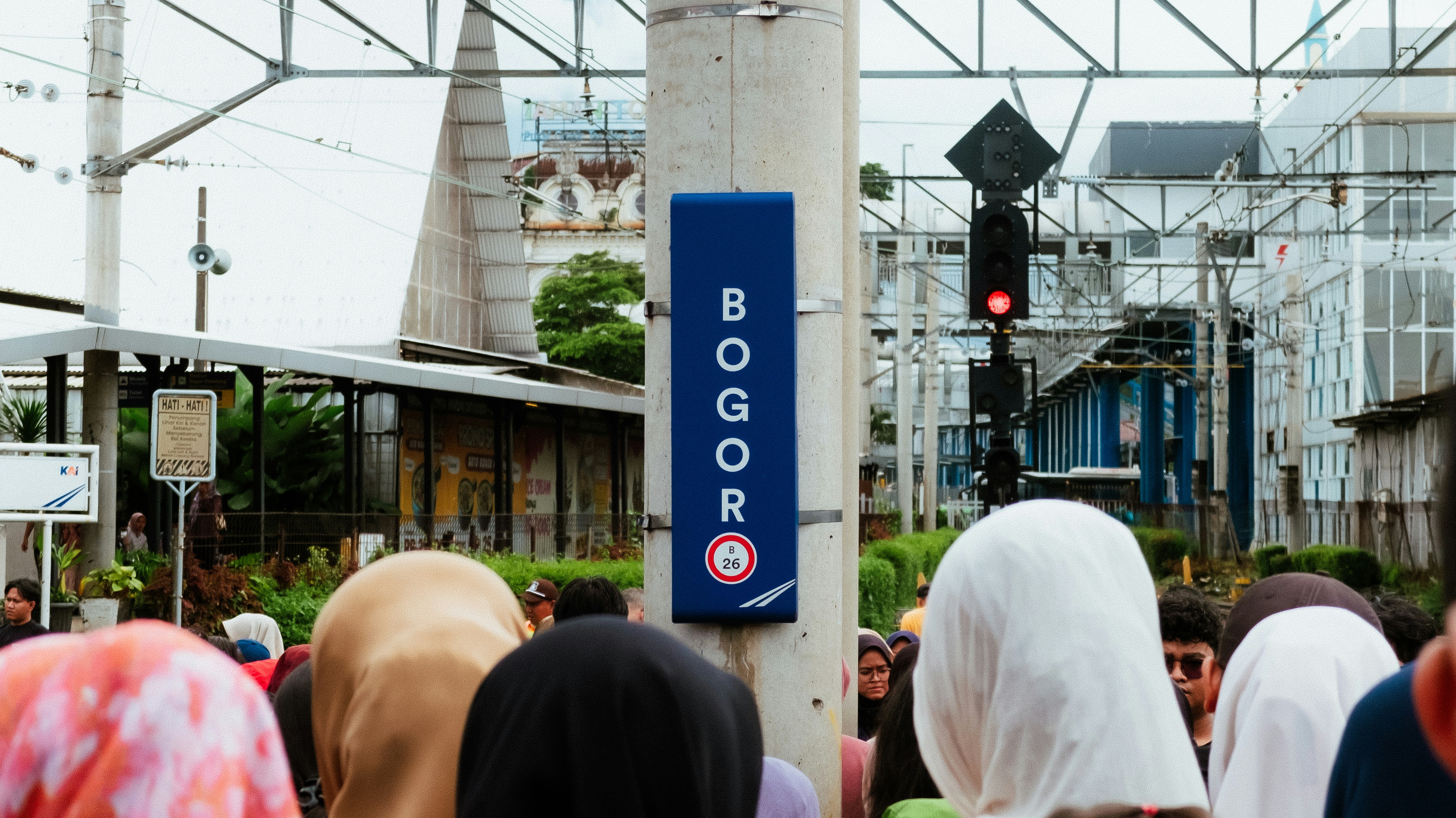 Blue Pillar Meets a Sea of Heads at Bogor Station