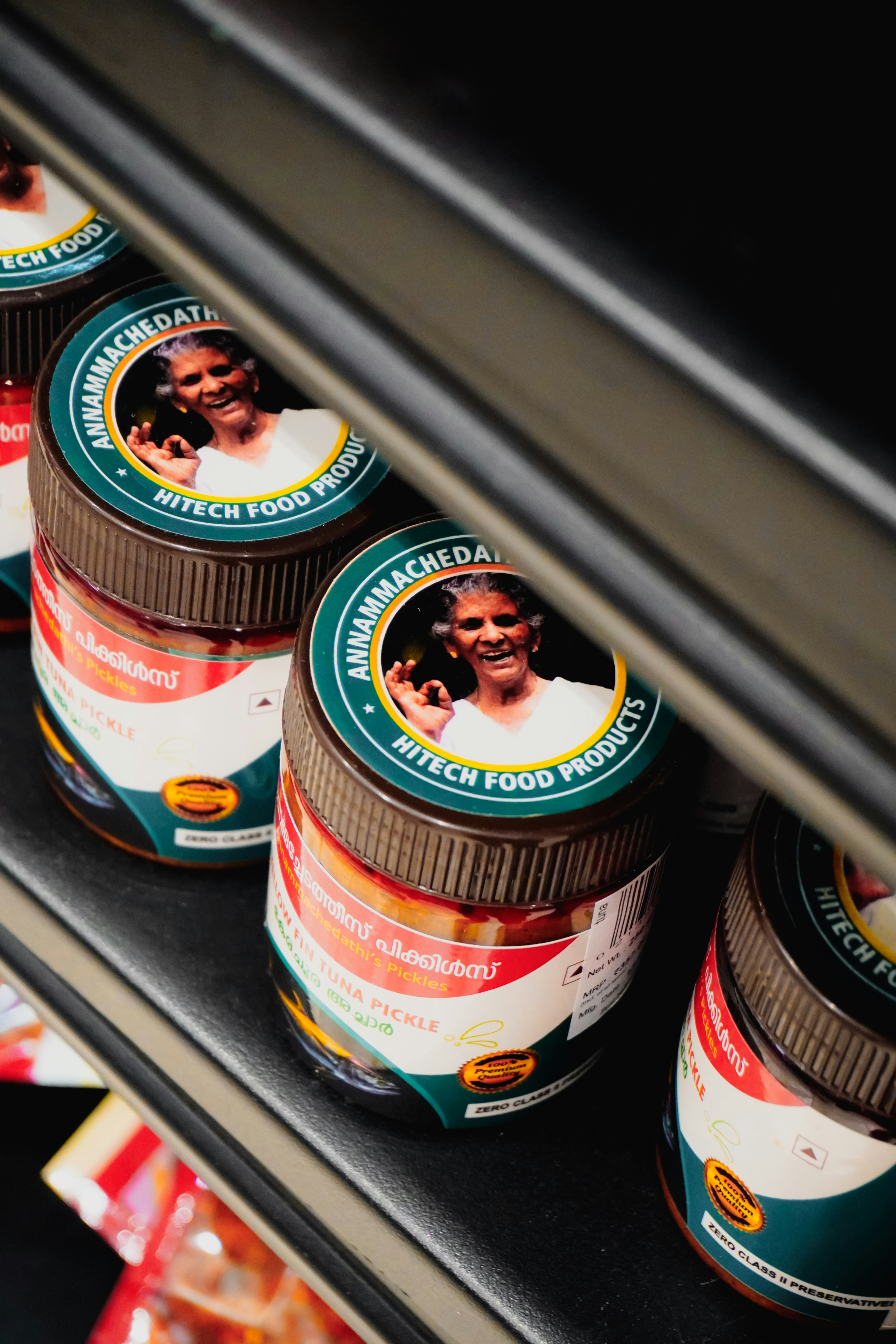 Close-up of Jars Labeled with Woman's Face in a Grocery Aisle