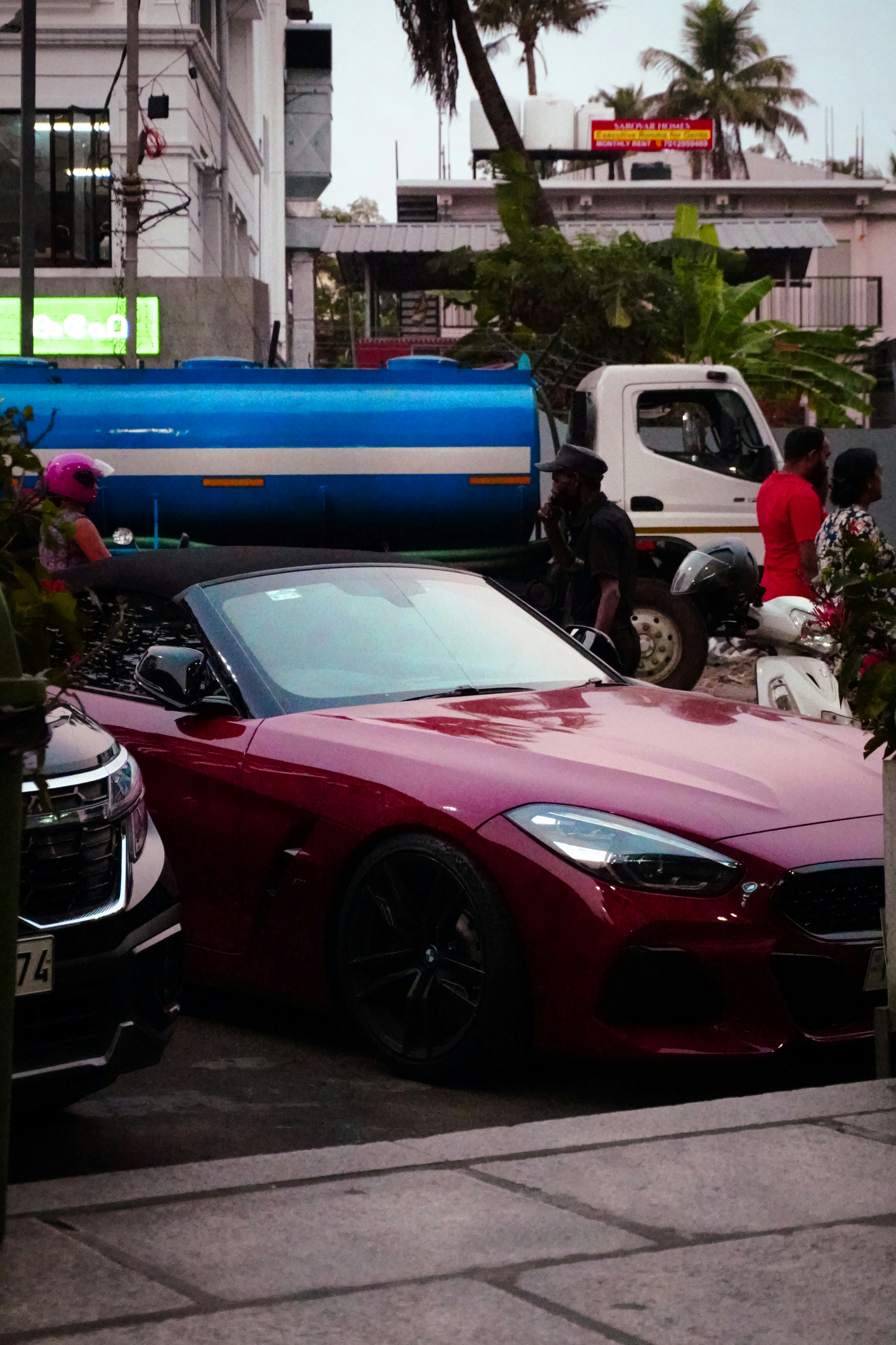 Crimson Convertible Crowned by Urban Pulse