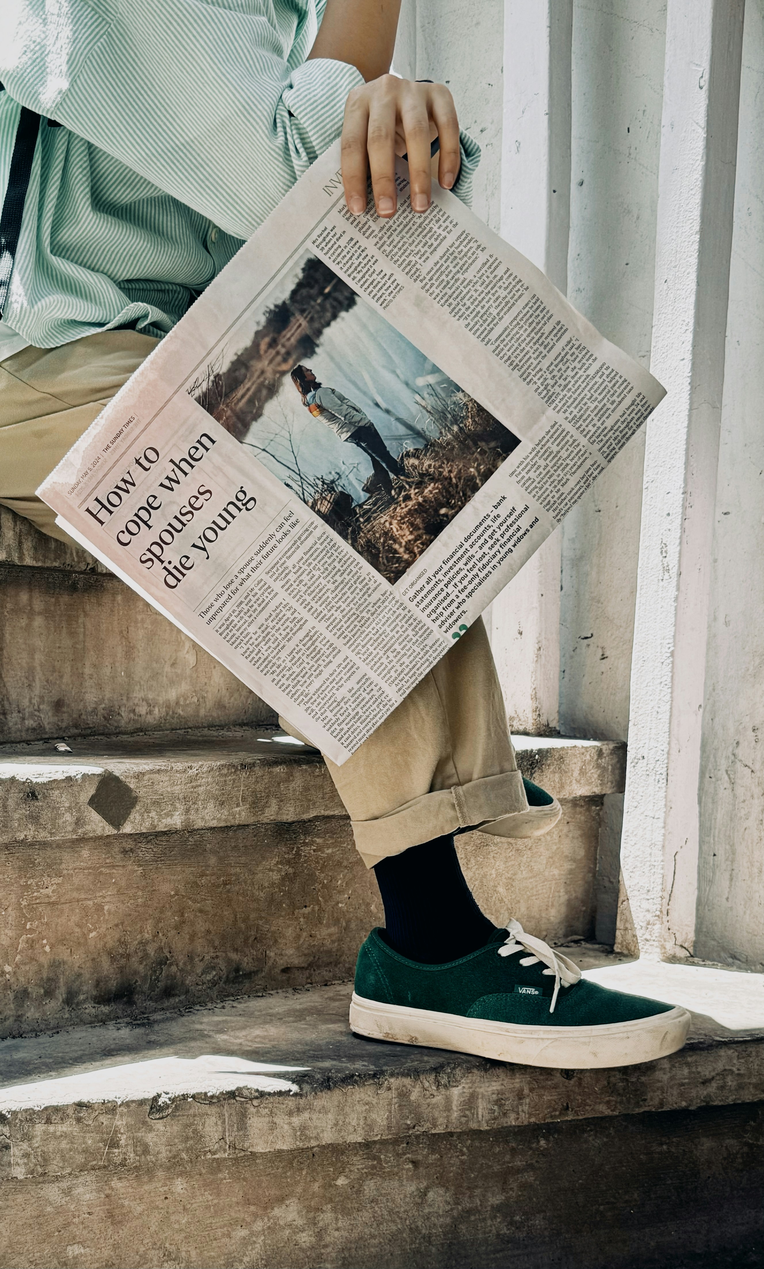 Newspaper Bond on the Steps: Quiet Confidence in a Green-Sneaker Moment