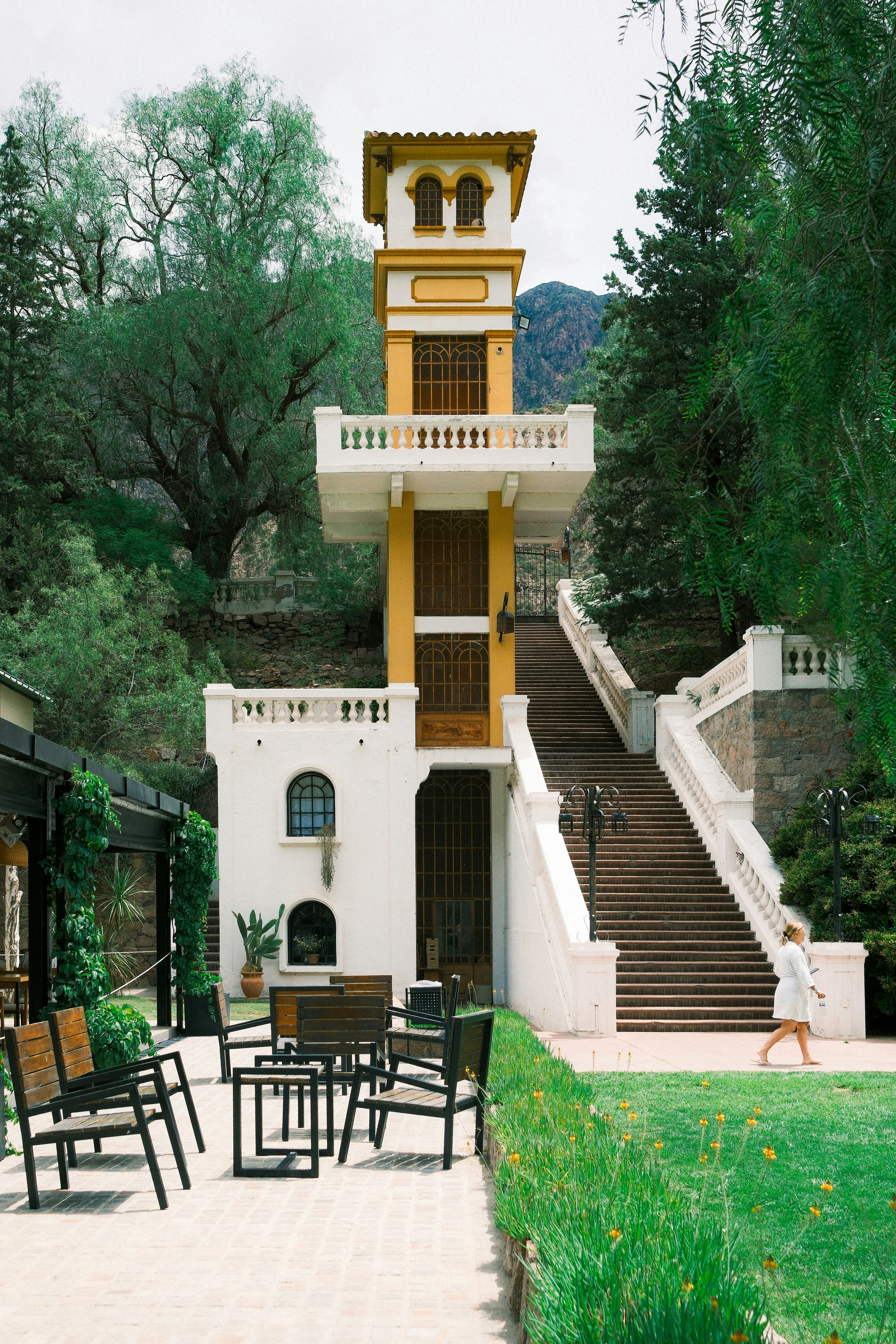 Golden Staircase Tower Resting Amid Greenery