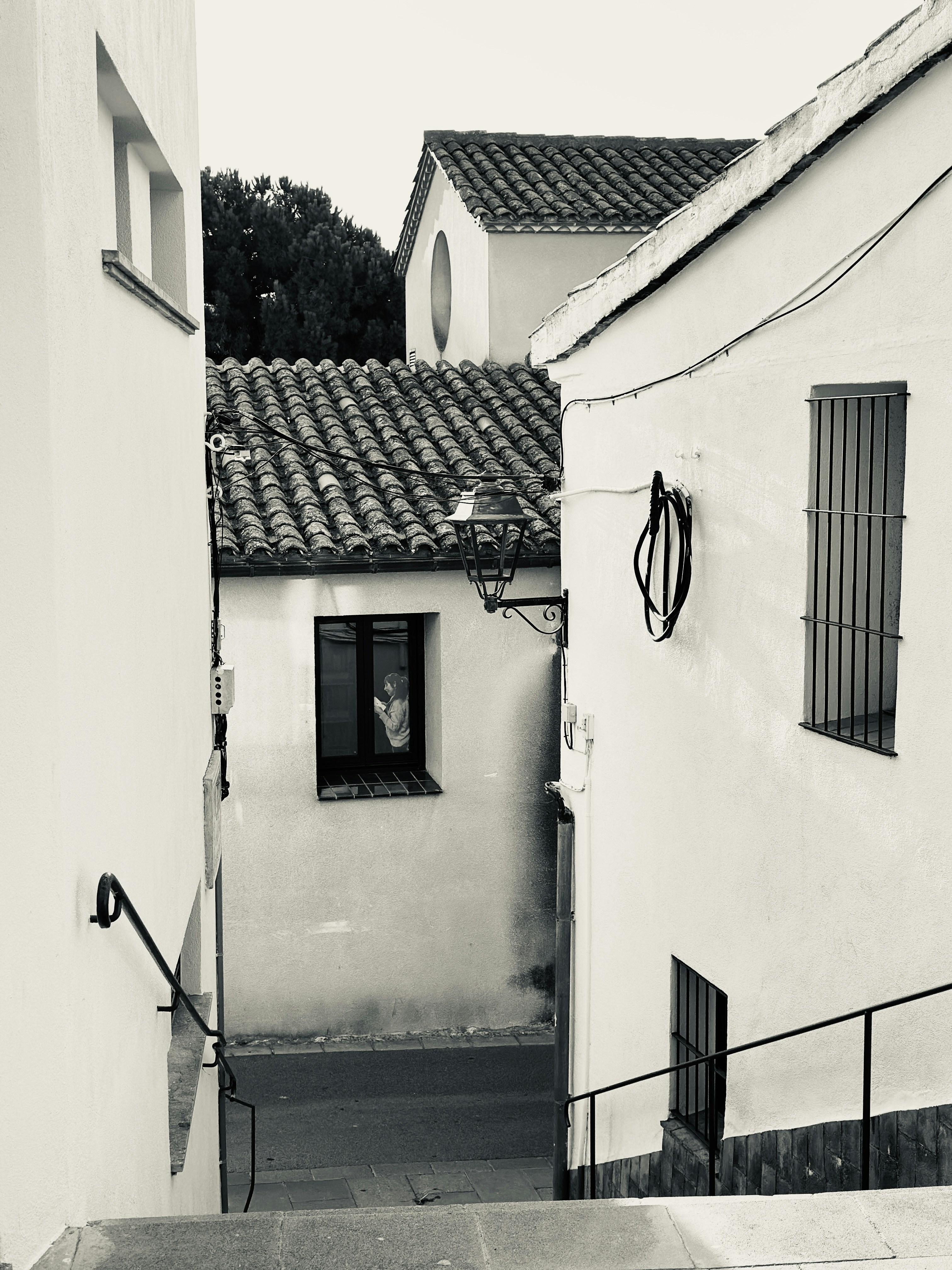 Quiet Staircase Through a Sunlit Andalucian Lane