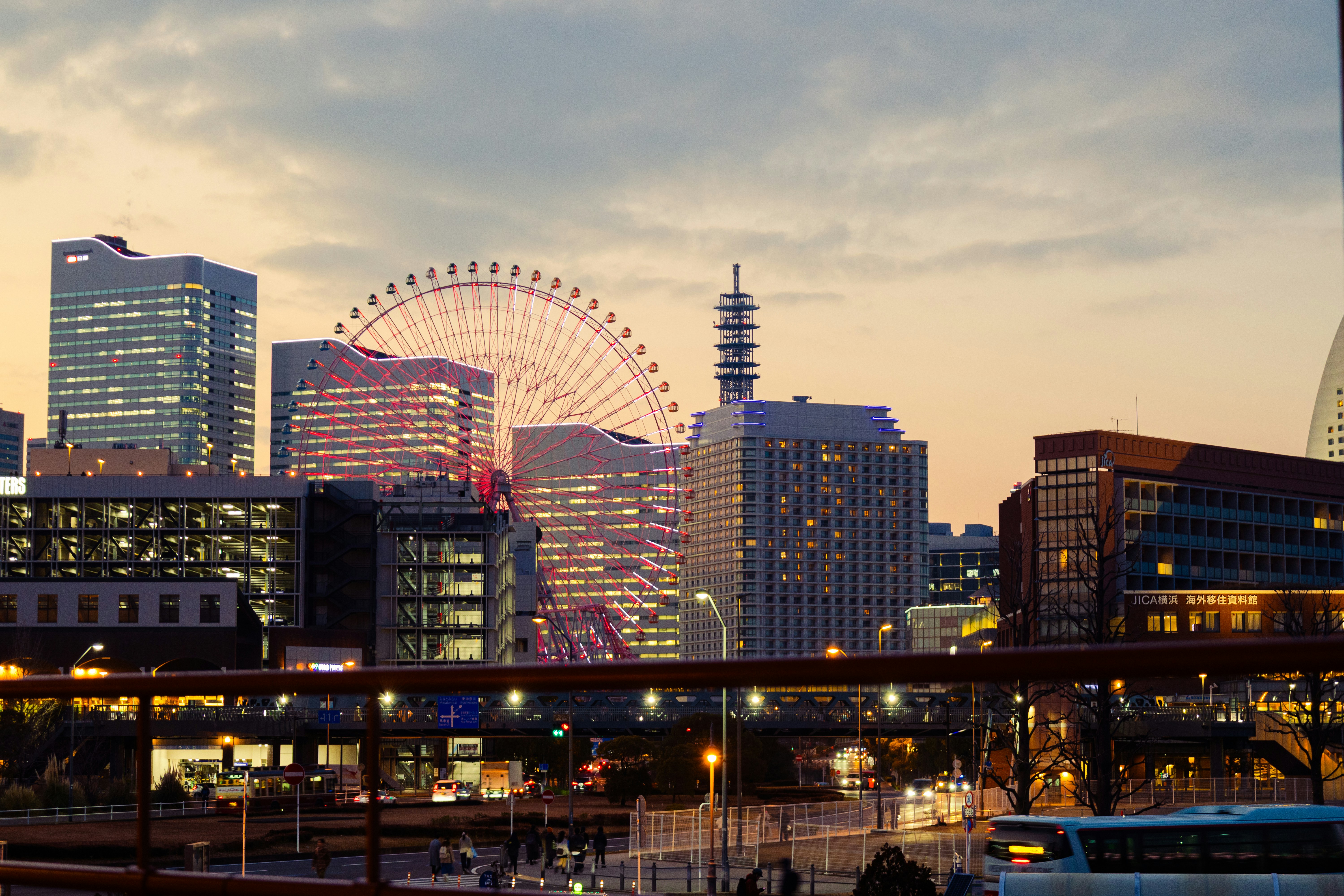 City Sunset Symphony: ferris wheel glow over a lit skyline