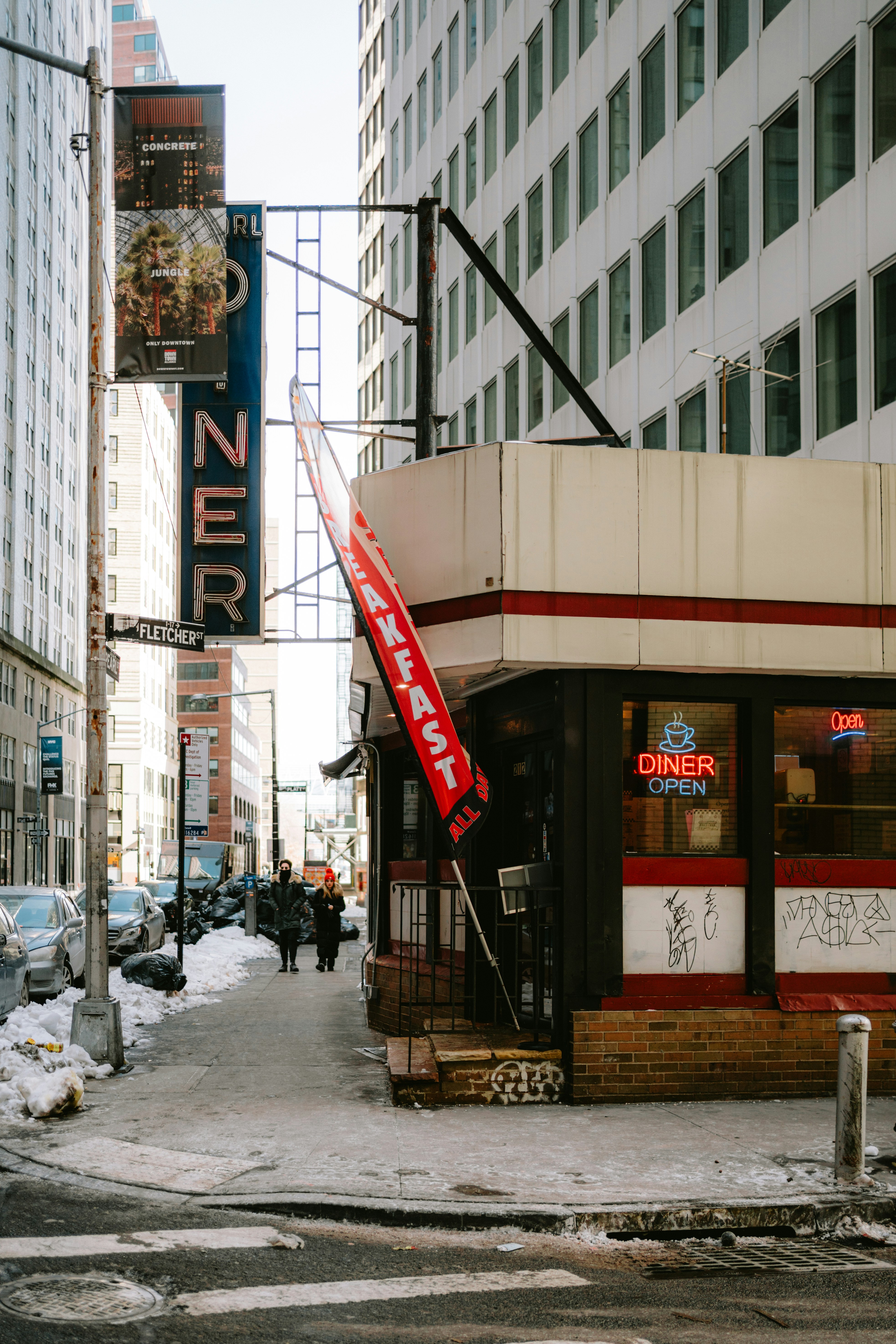 Corner Diner at Dusk: Neon, Snow, and Steel