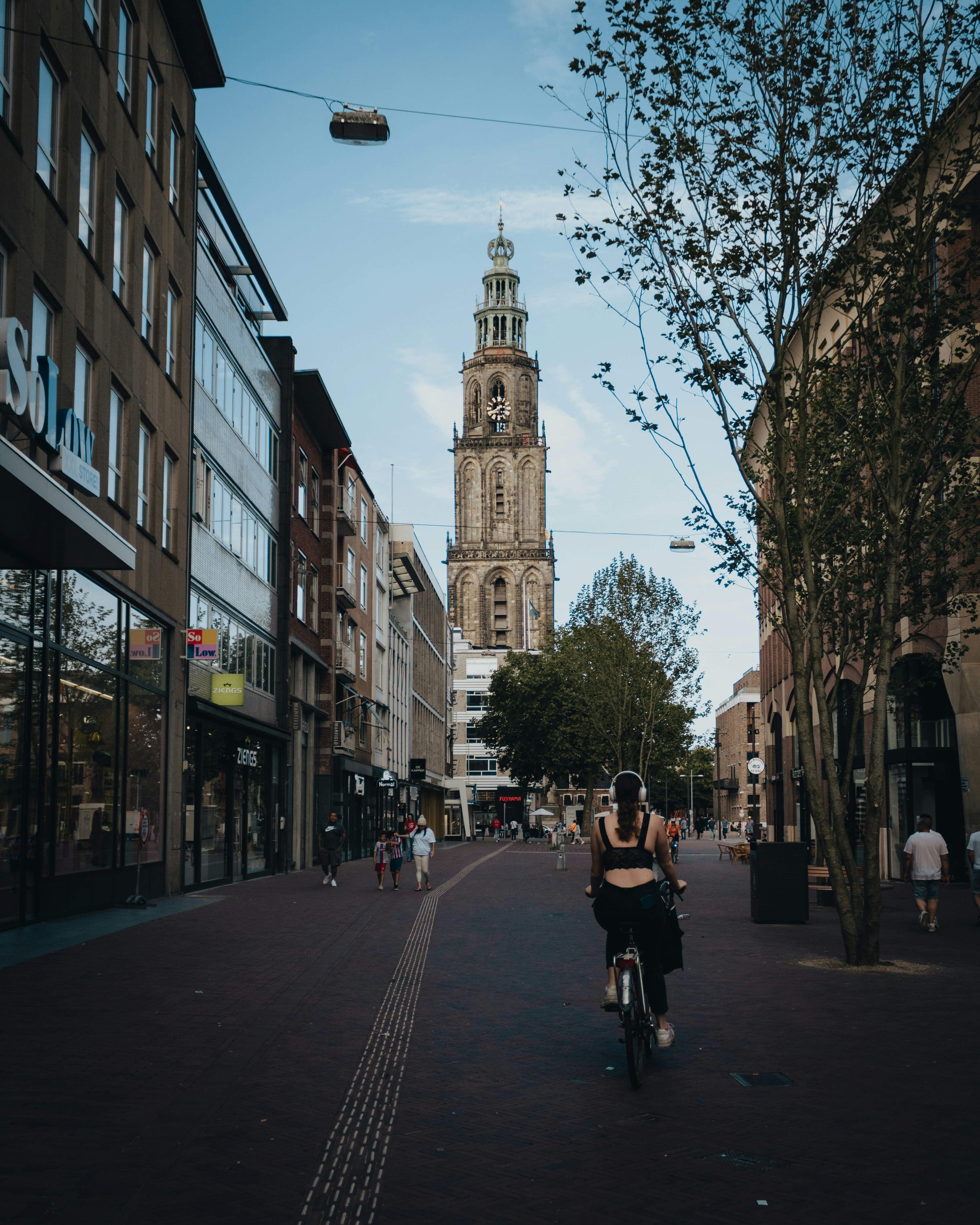 Rider in the Alleyway Toward the Cathedral Tower
