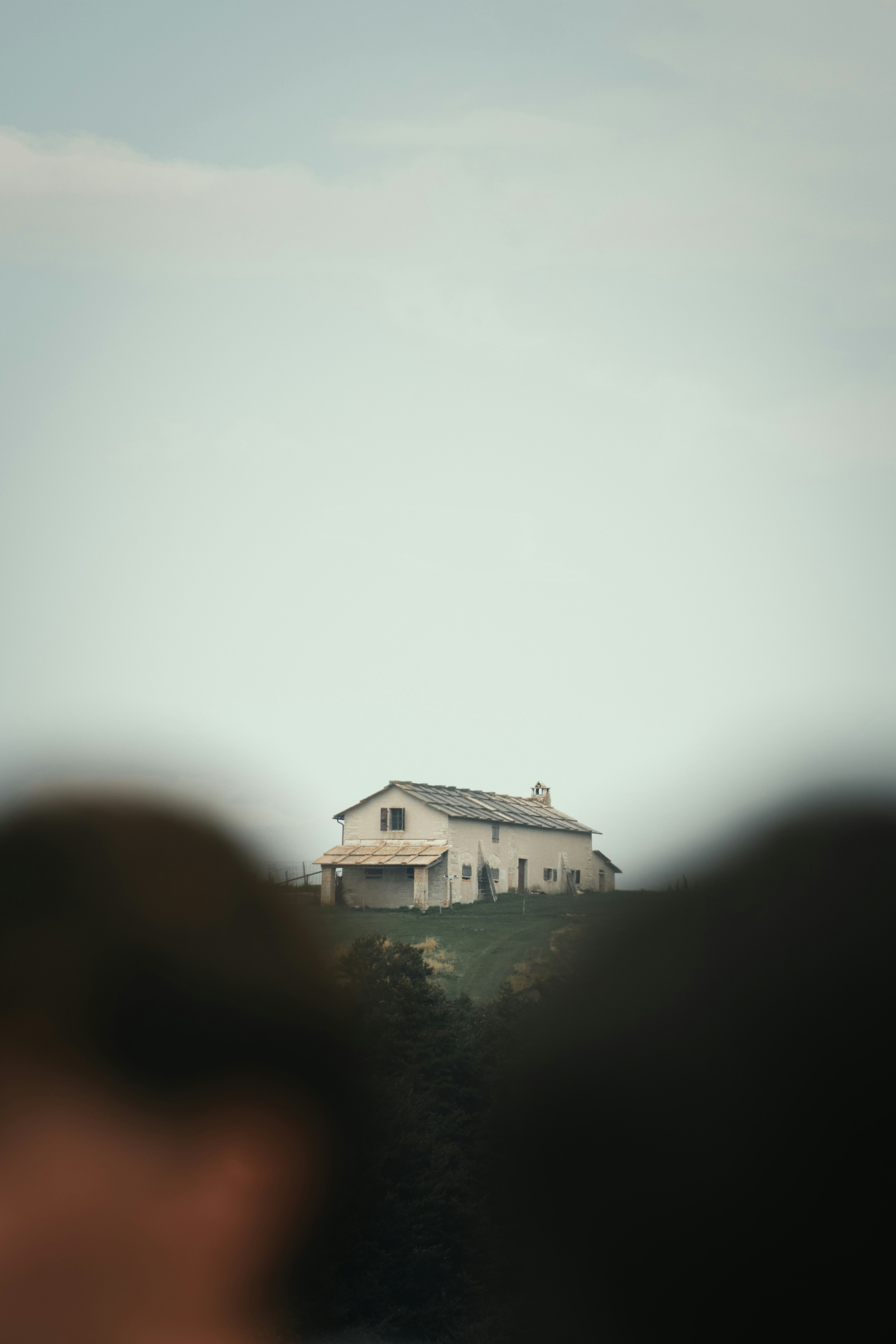 Isolated Farmhouse Through a Horizon of Blur