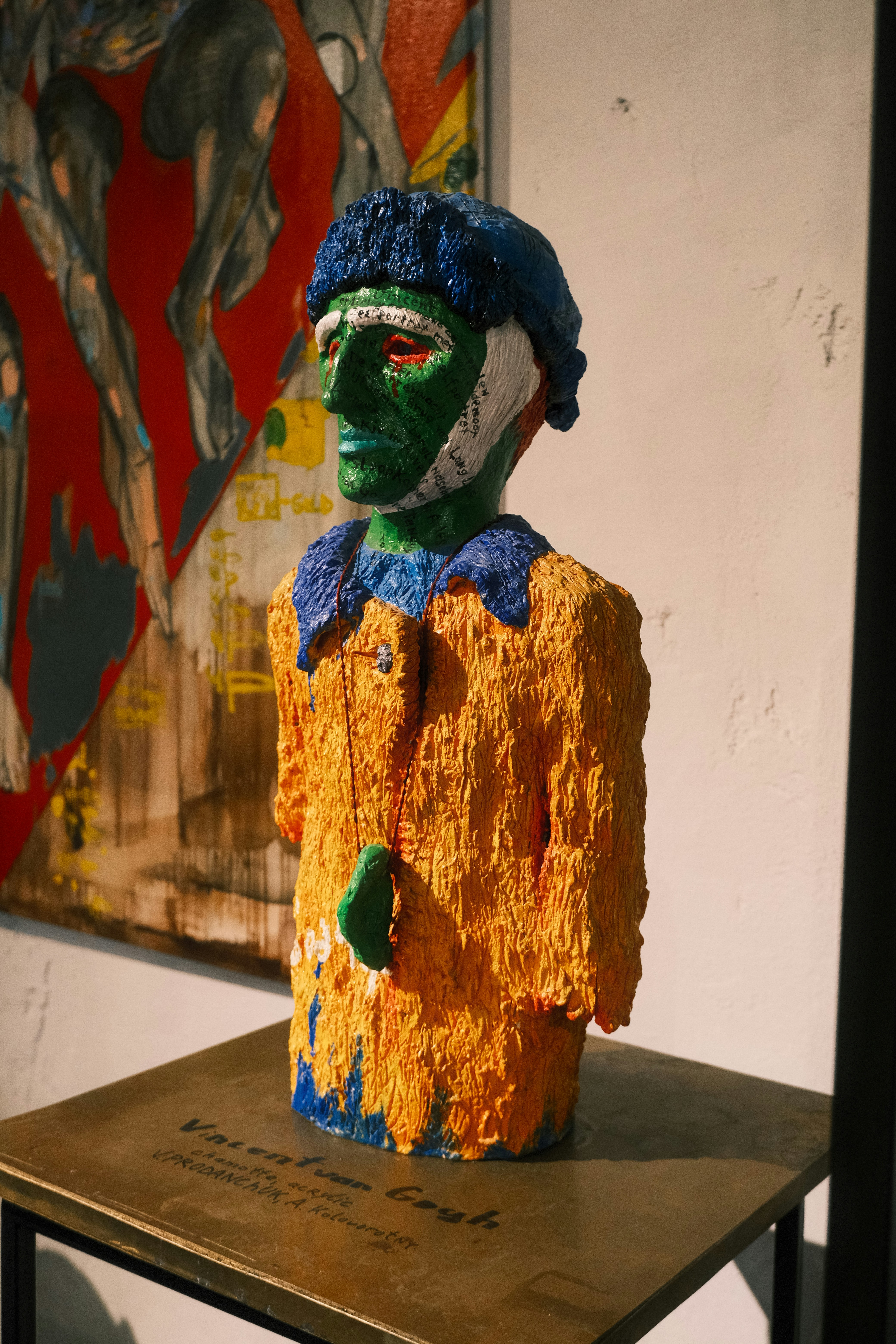 Colored Sculpture in a Gallery: A Nod to Handcrafted Portraiture